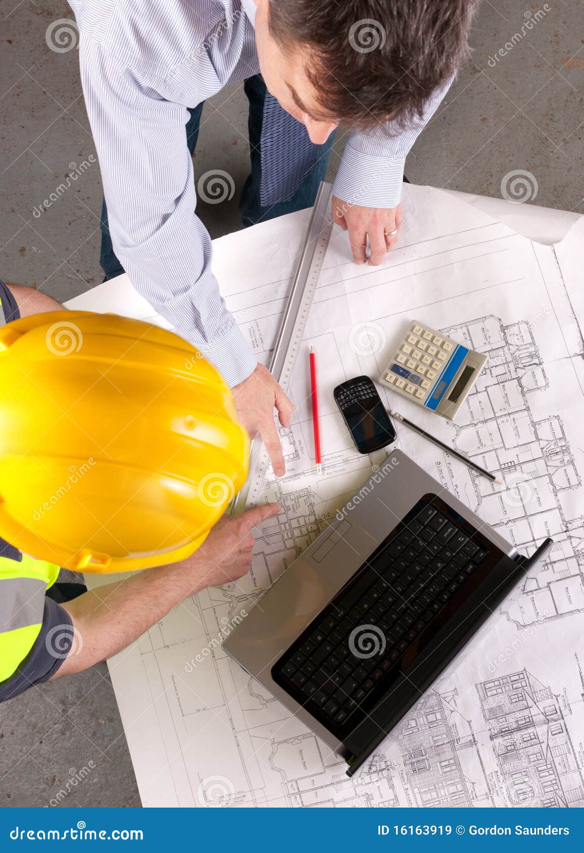 Two Men Discuss Building Plans Stock Image - Image of phone, laptop ...