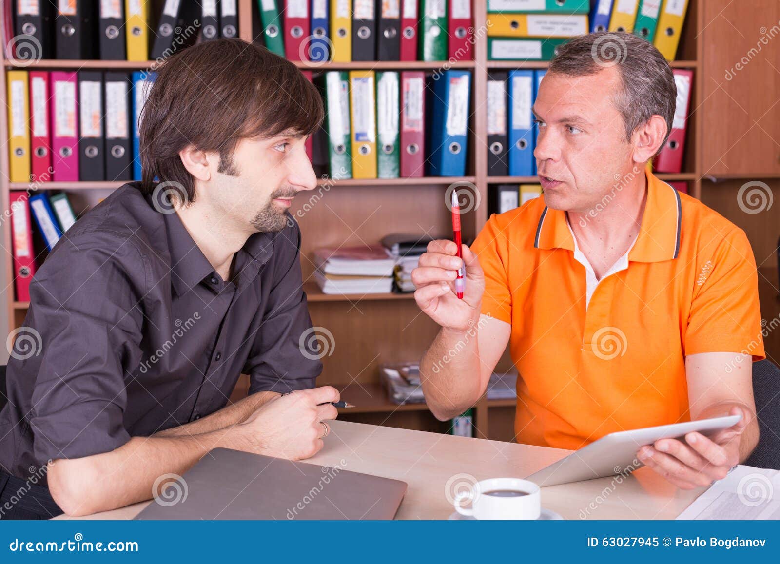 Two men discuss on meeting stock image. Image of caucasian - 63027945