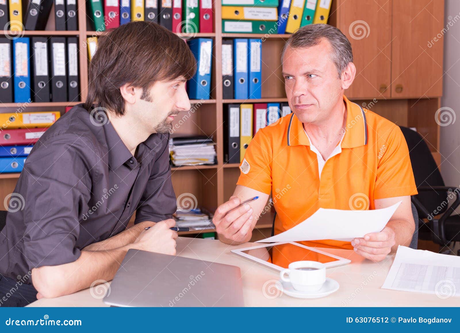 Two men discuss on meeting stock photo. Image of communication - 63076512