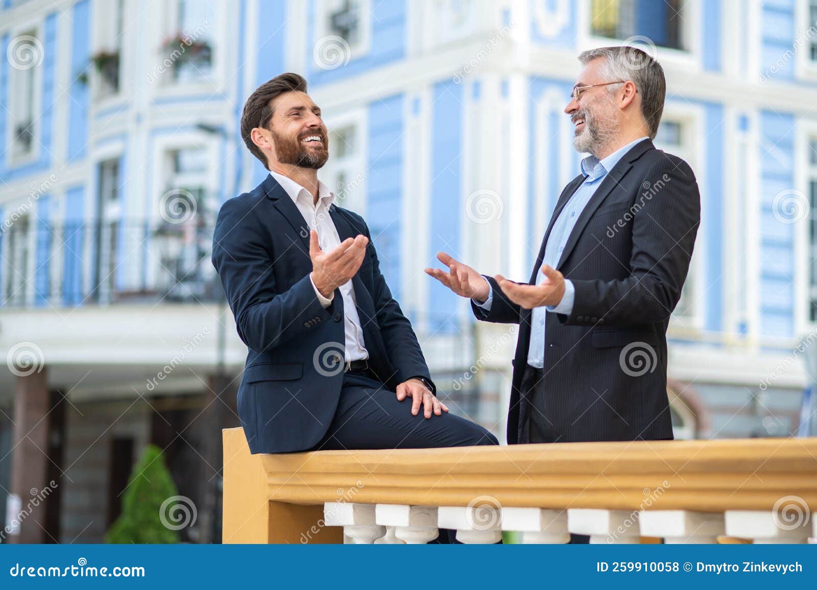 Two Men Discussing Business Issues and Looking Involved Stock Photo ...