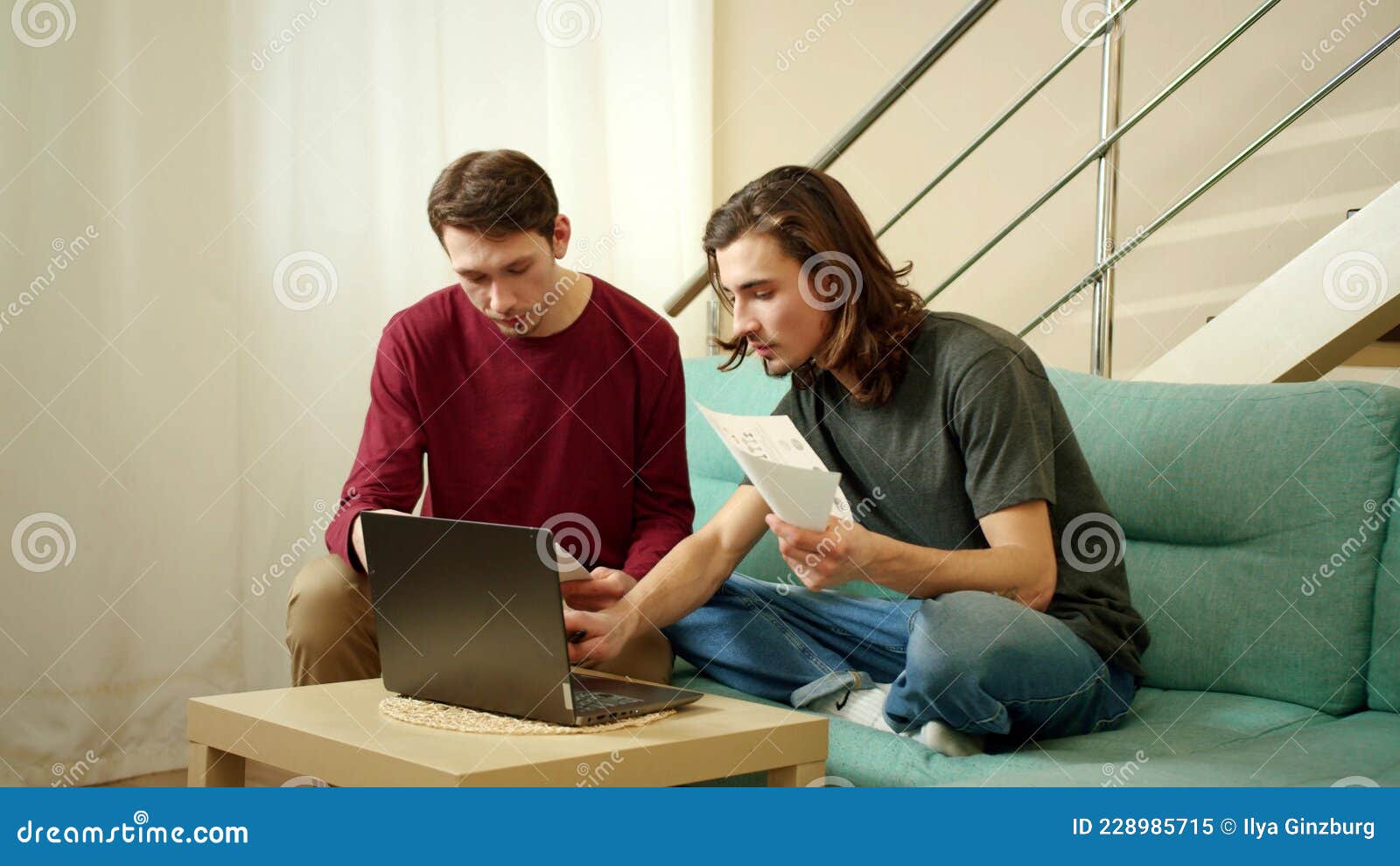 Two Men are Discussing and Looking through Documents Stock Image ...