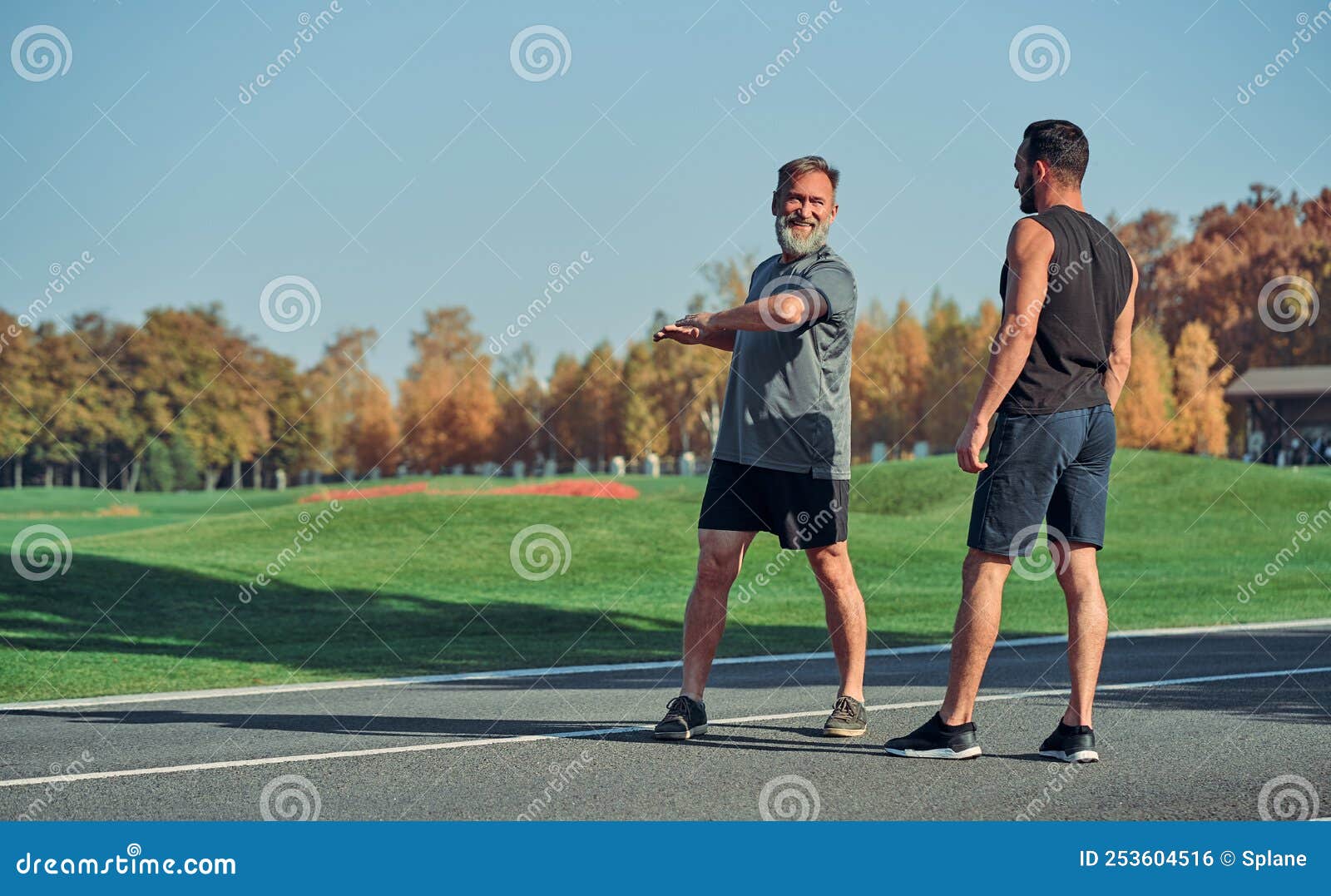 The Two Men Doing Exercise Outdoor. Stock Photo - Image of retirement ...