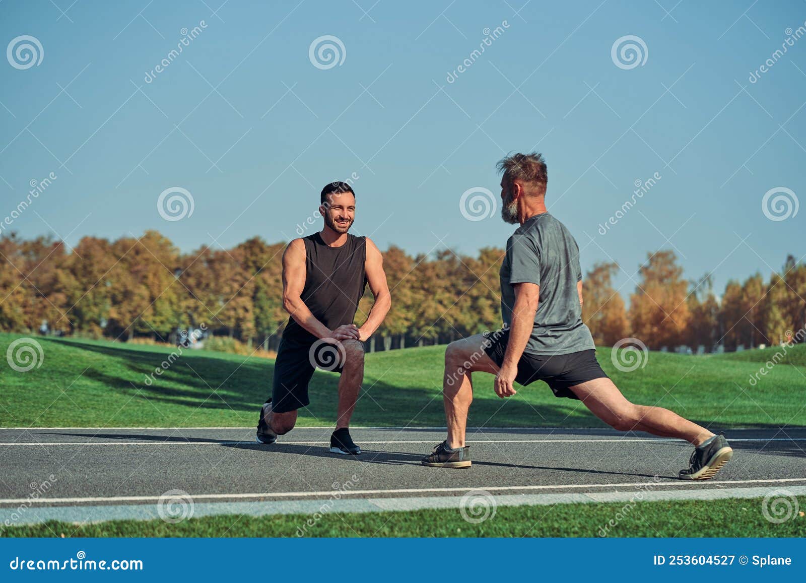The Two Men Doing Exercise Outdoor. Stock Image - Image of alley ...