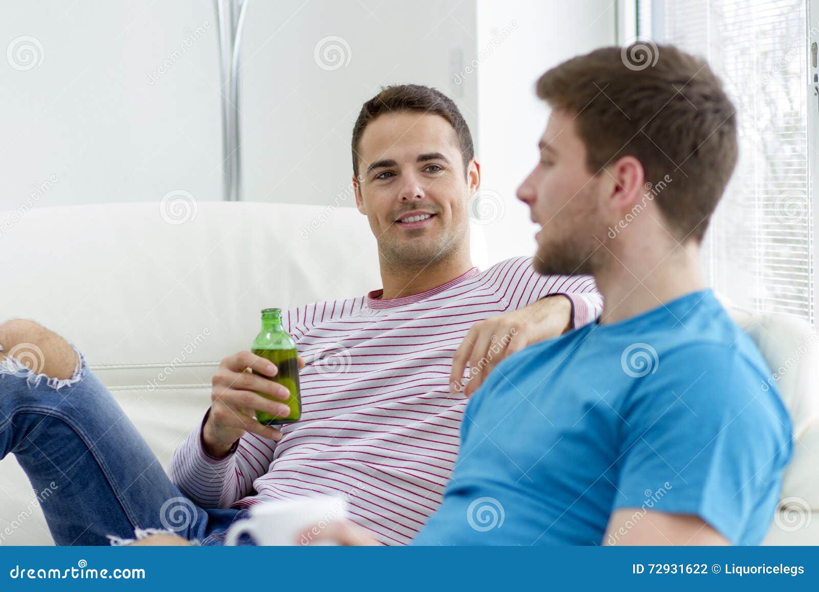Two Men Drinking Beer at Home Stock Photo - Image of beer, daytime ...