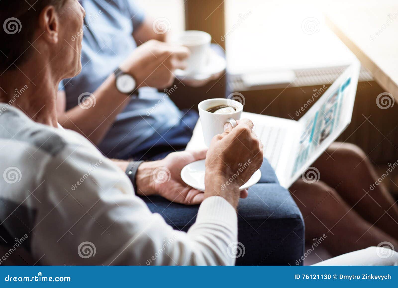 Two men drinking coffee stock photo. Image of communication - 76121130