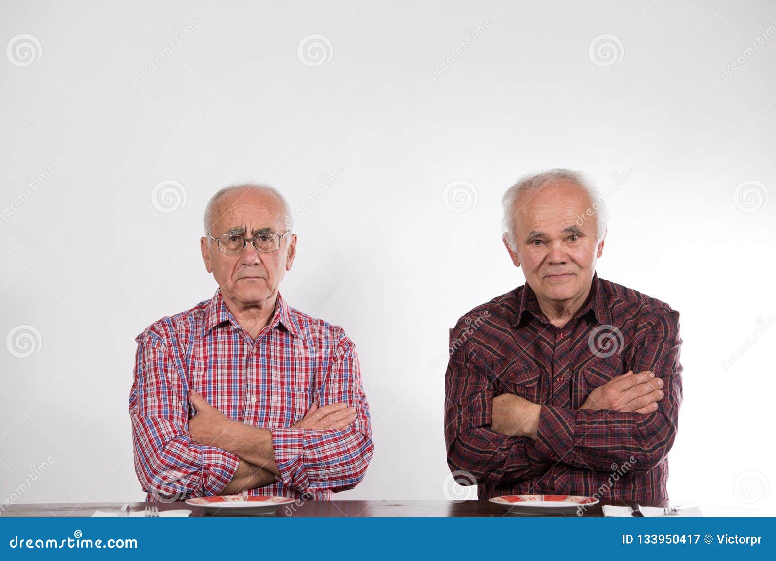 Two men with empty plates stock image. Image of emotions - 133950417