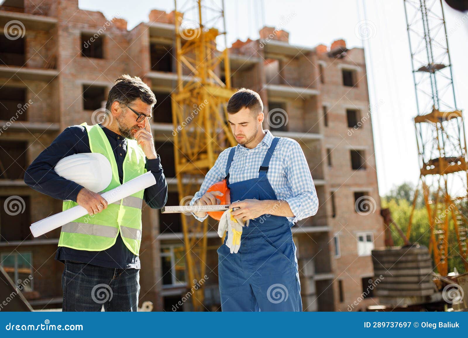 Two Men Engineers at a Construction Site are Talking Stock Image ...