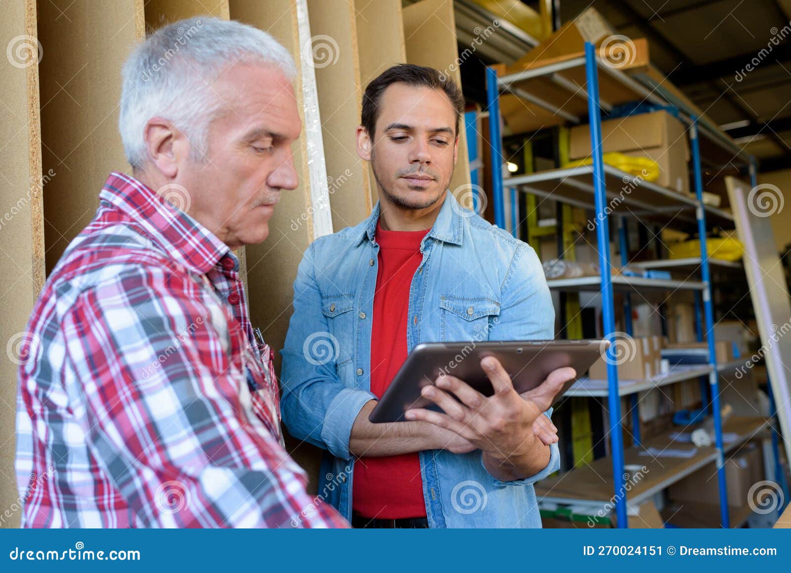 Two Men in Factory Stores Looking at Tablet Computer Stock Image ...
