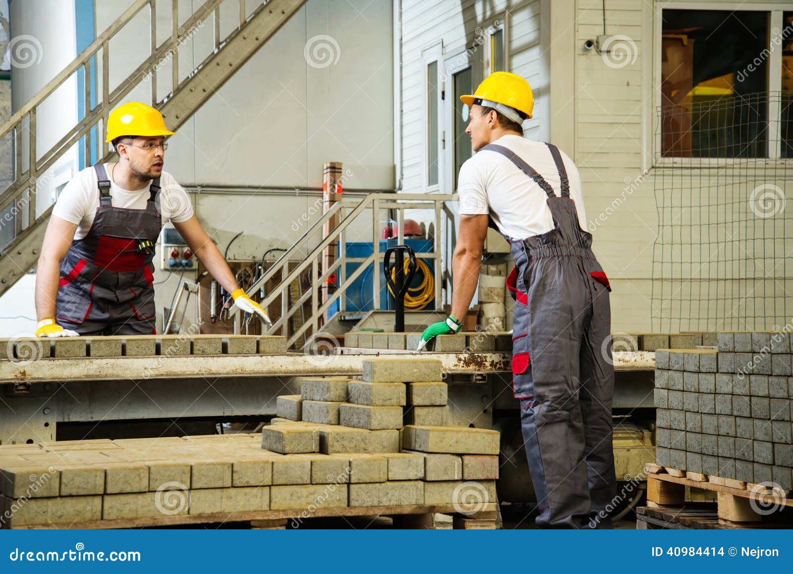 Two men on a factory stock photo. Image of concrete, factory - 40984414