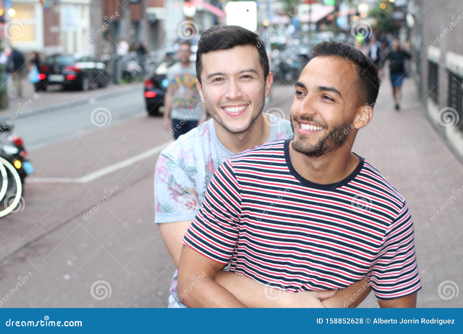Two men falling in love stock photo. Image of outdoor - 158852628