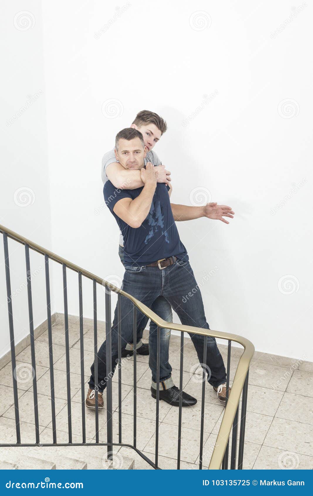 A Two Men Fight at the Staircase Stock Image - Image of stairs, defense ...