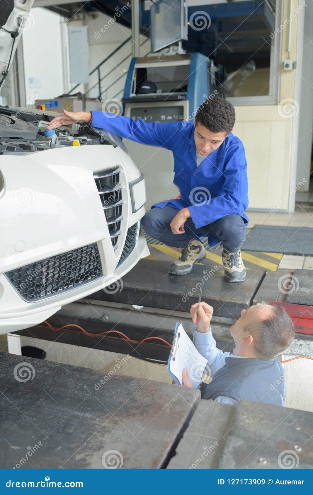 Two man fixing car problem stock image. Image of motor - 127173909