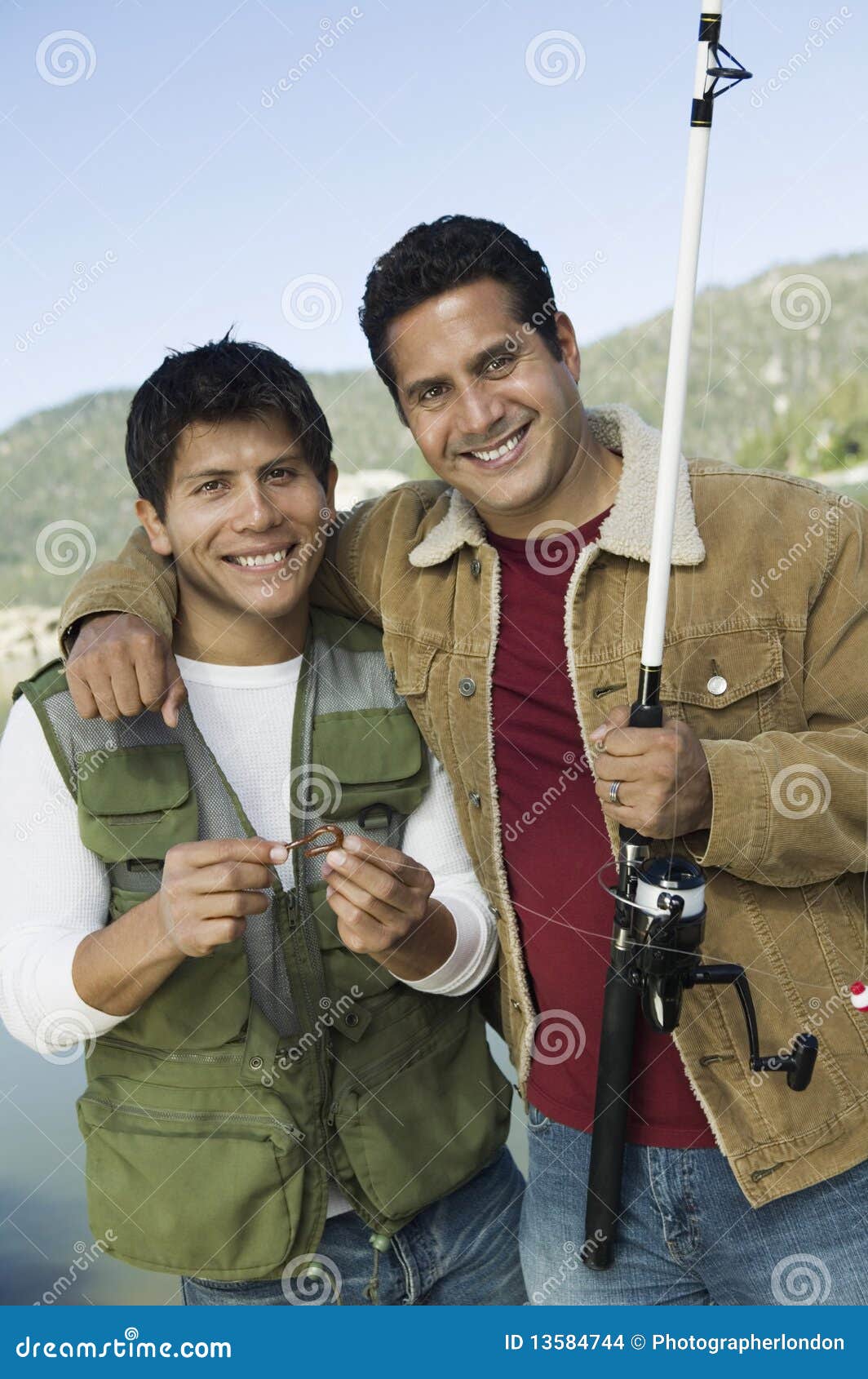 Two Men Fly Fishing on Lake Stock Photo - Image of people, smiling ...