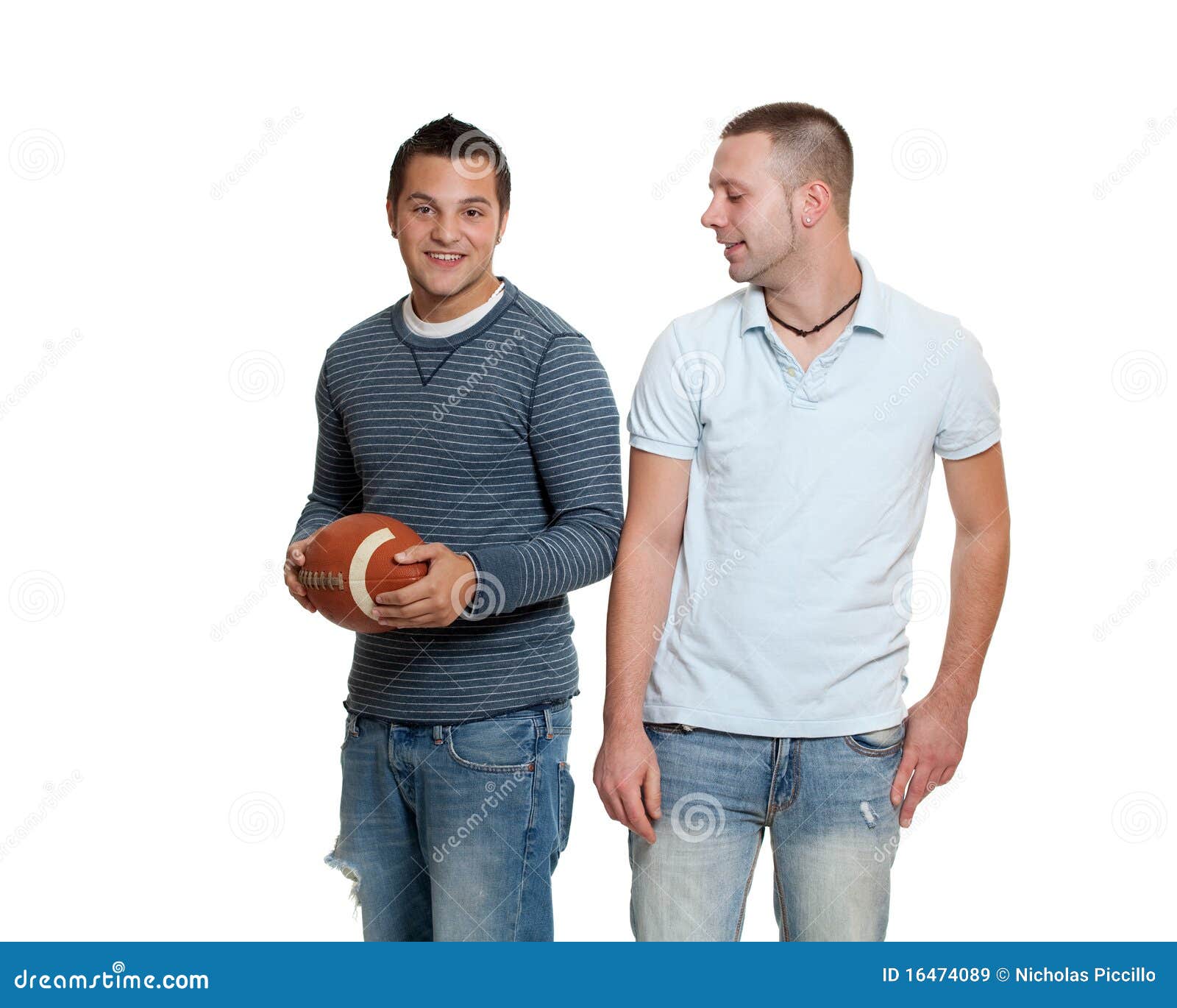 Two men with football stock image. Image of friends, young - 16474089