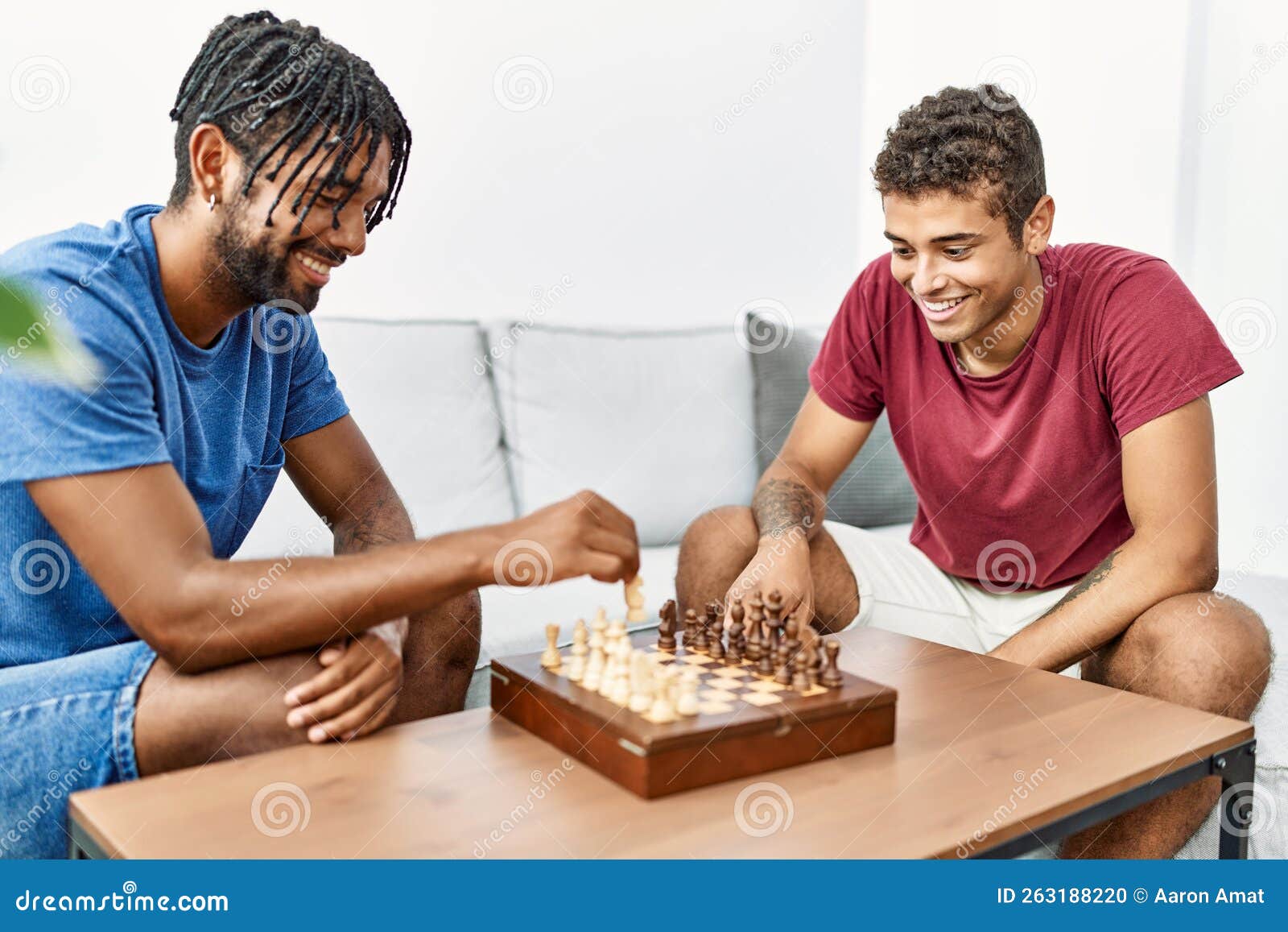Two Men Friends Playing Chess Sitting on Sofa at Home Stock Photo ...