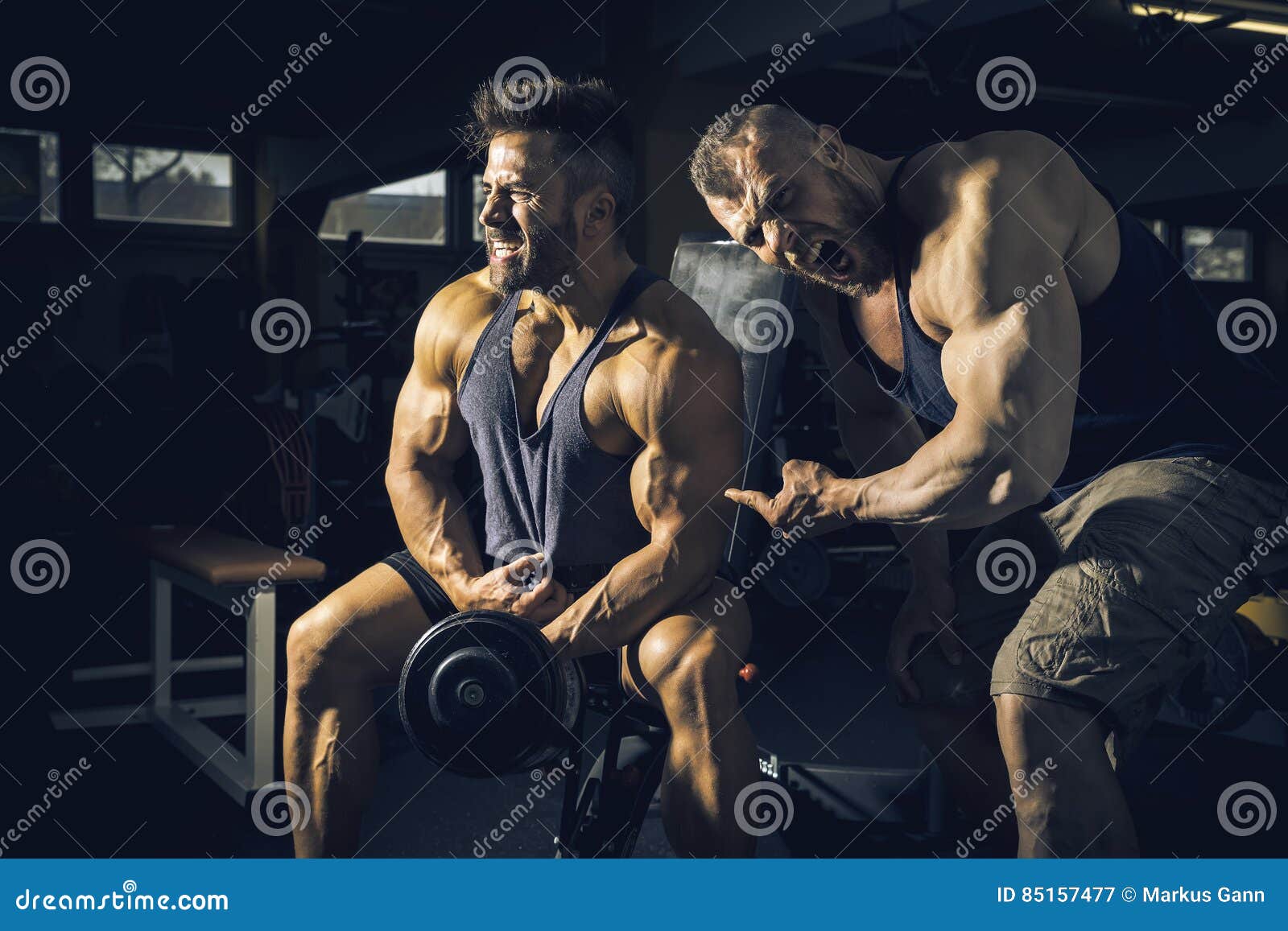 Two men at the gym stock image. Image of people, sporty - 85157477