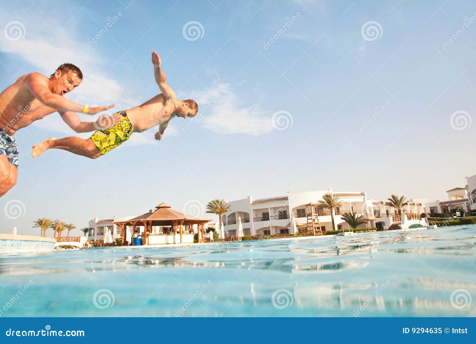 Two Men Having Fun at Swimming Pool. Stock Image - Image of energy ...