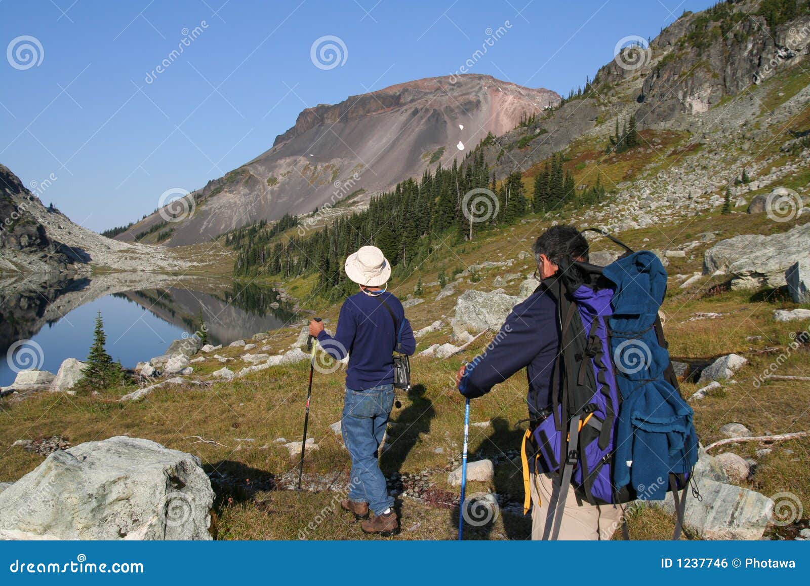 Two Men Hiking at Ring Lake Stock Photo - Image of leisure, explore ...