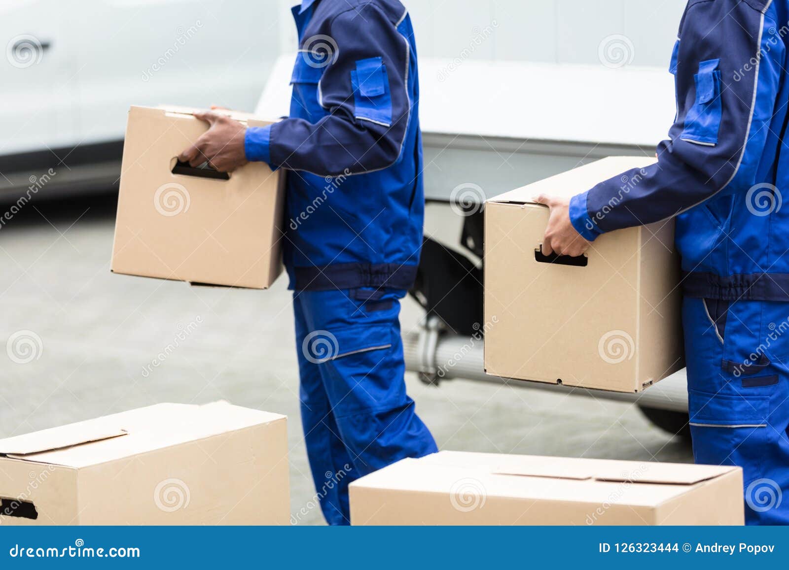 Two Men Holding the Cardboard Boxes Stock Photo - Image of house ...
