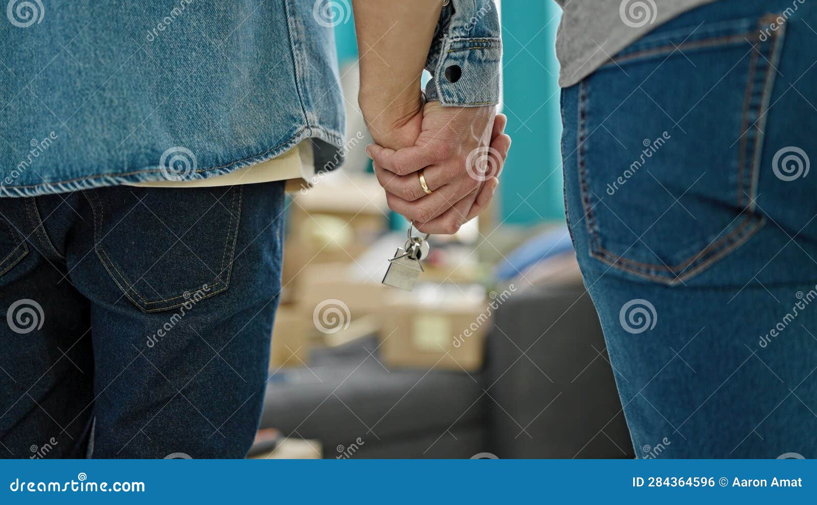 Two Men Holding Keys with Hands Together at New Home Stock Photo ...