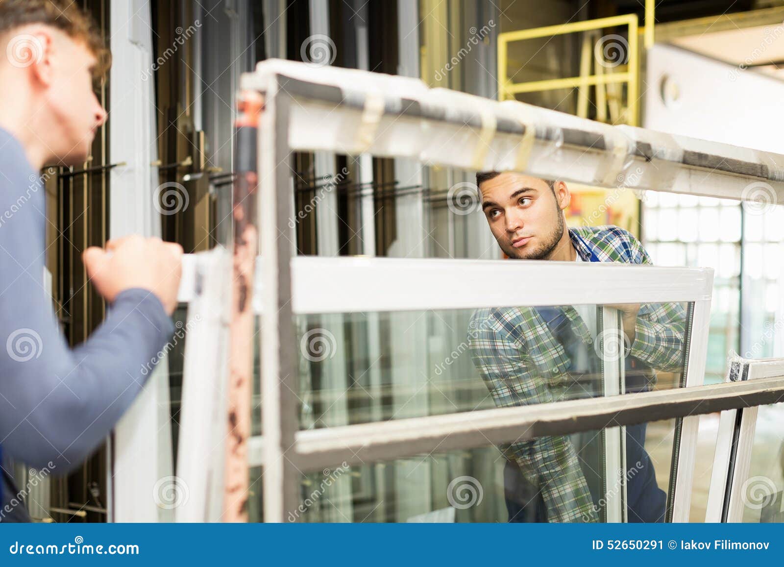 Two men inspecting windows stock image. Image of factory - 52650291