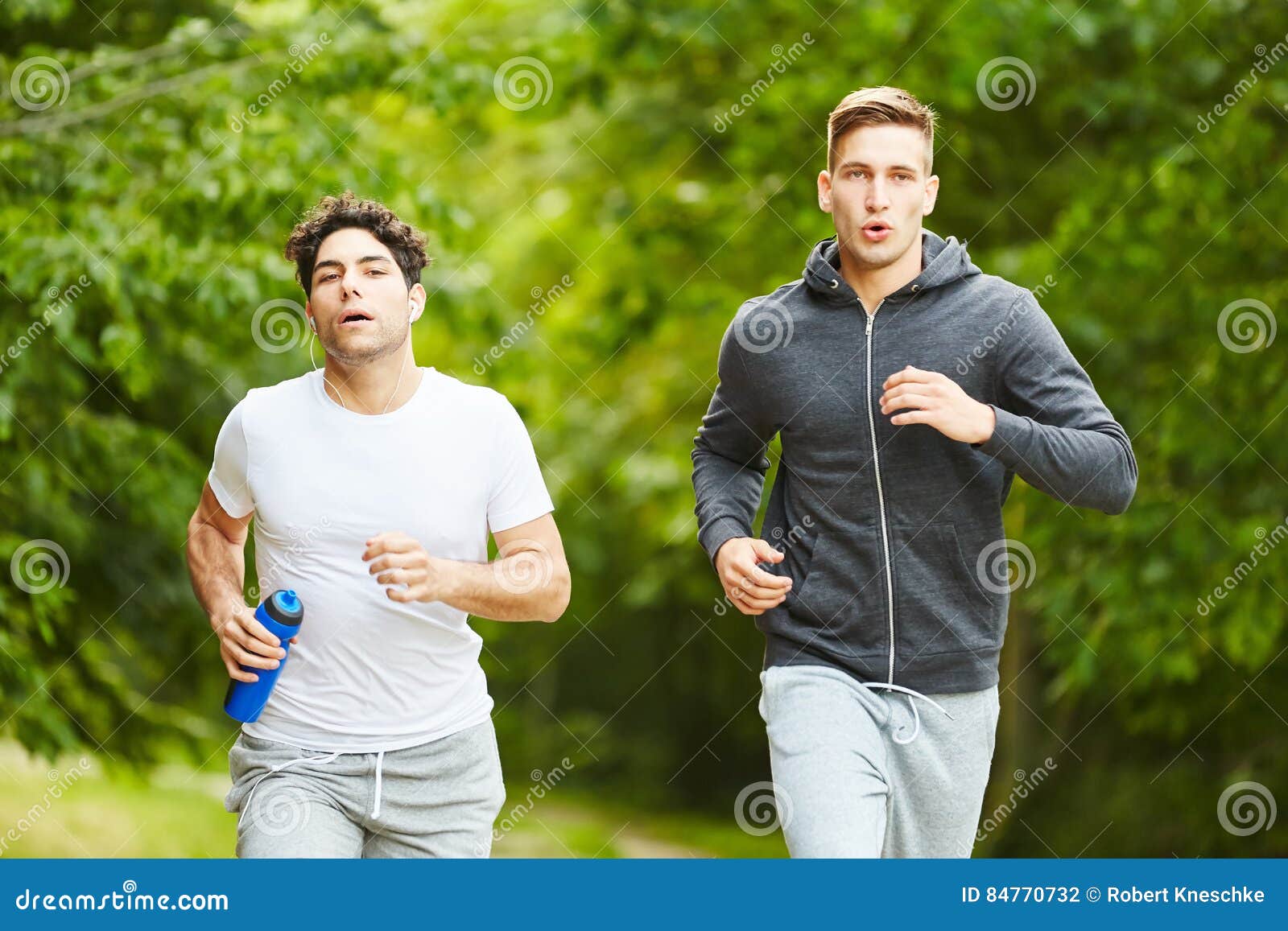Two Men Jogging at the Park Stock Photo - Image of people, outside ...