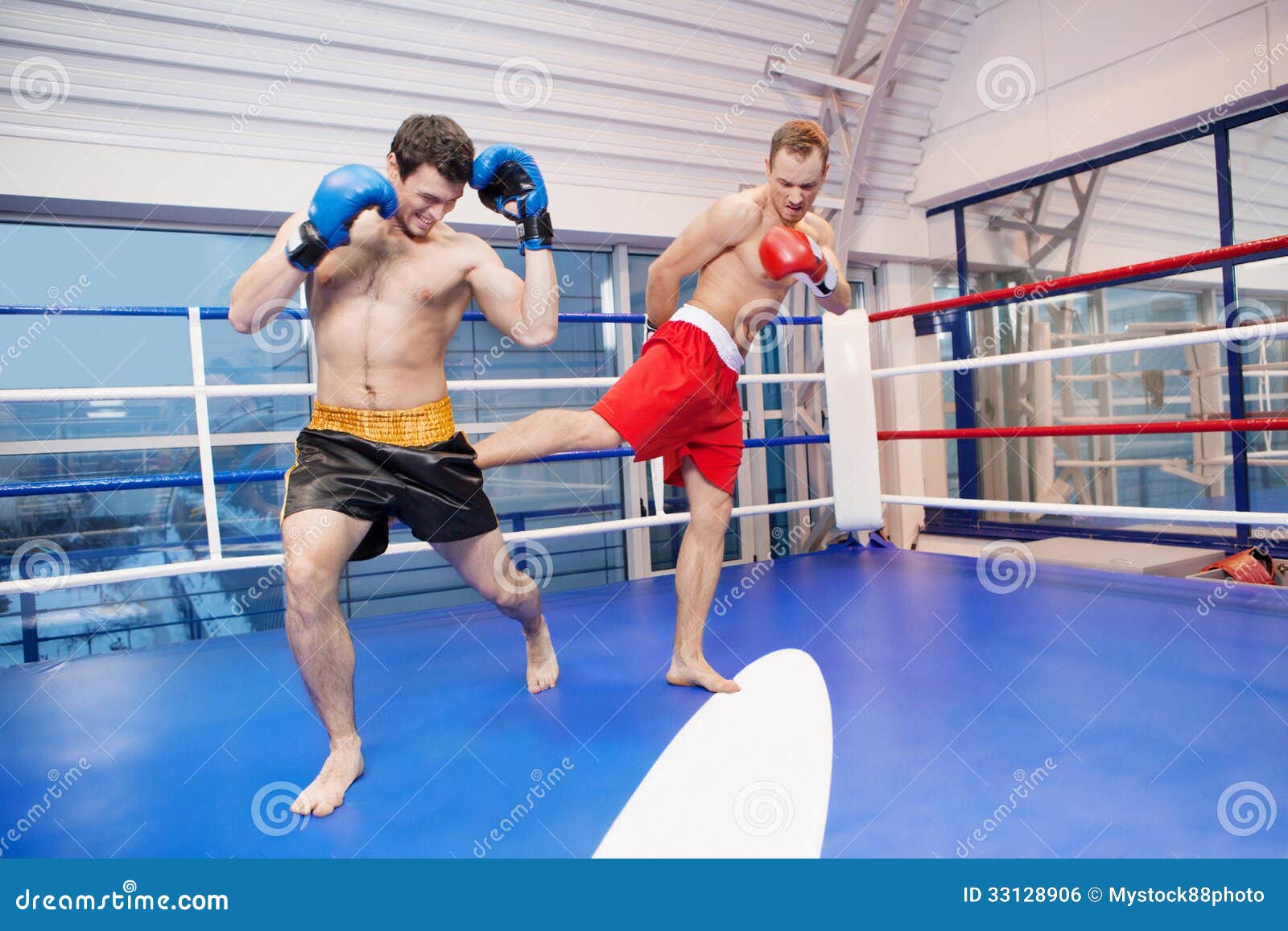 Two men kickboxing. stock photo. Image of activity, people - 33128906