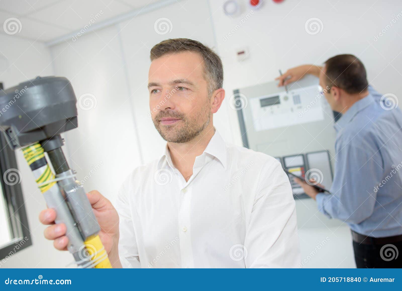 Two men in lab stock photo. Image of read, clipboard - 205718840