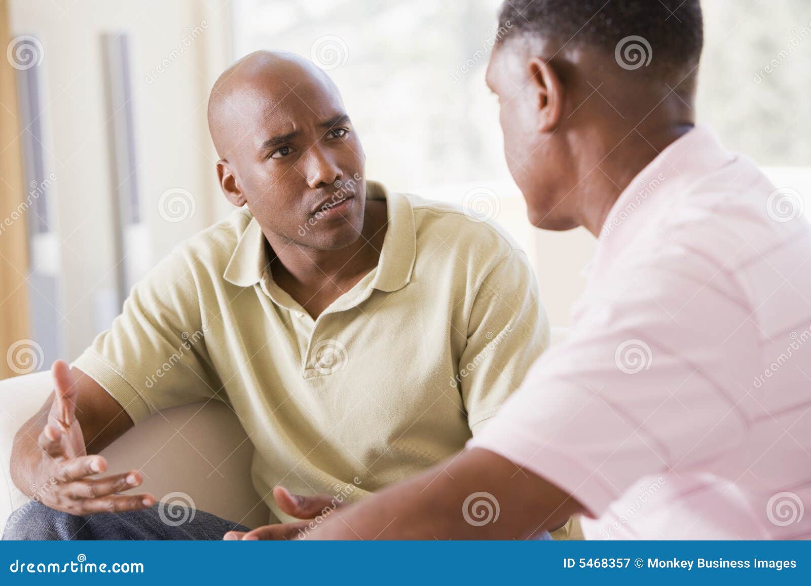 Two Men in Living Room Talking Stock Image - Image of friends, chatting ...