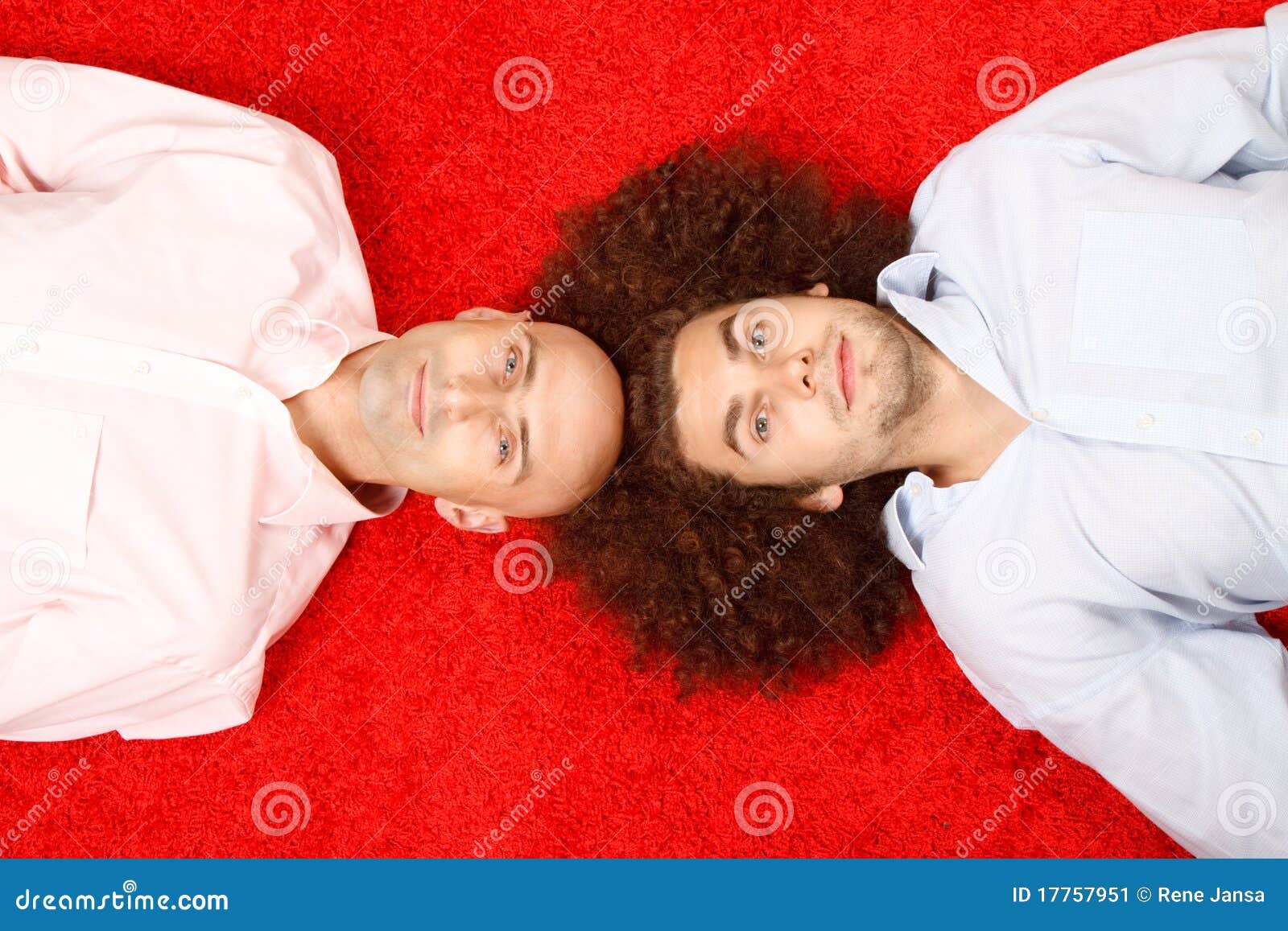 Two Men Lying on Red Carpet Stock Image - Image of bald, lying: 17757951