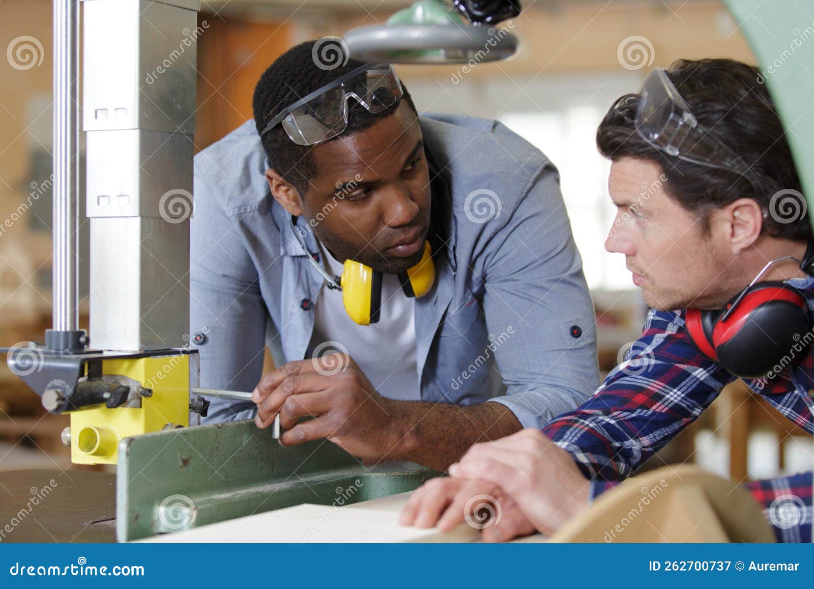 Two men measuring wood stock image. Image of craftsman - 262700737