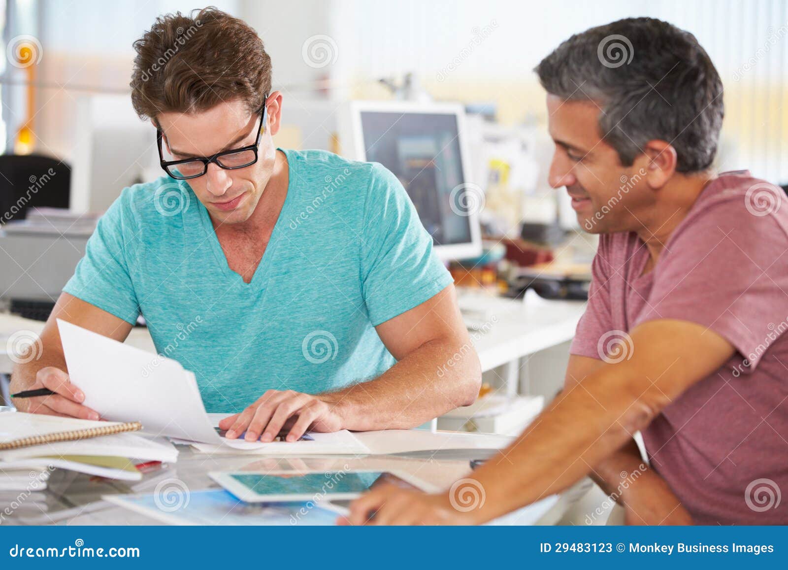 Two Men Meeting in Creative Office Stock Image - Image of discussing ...