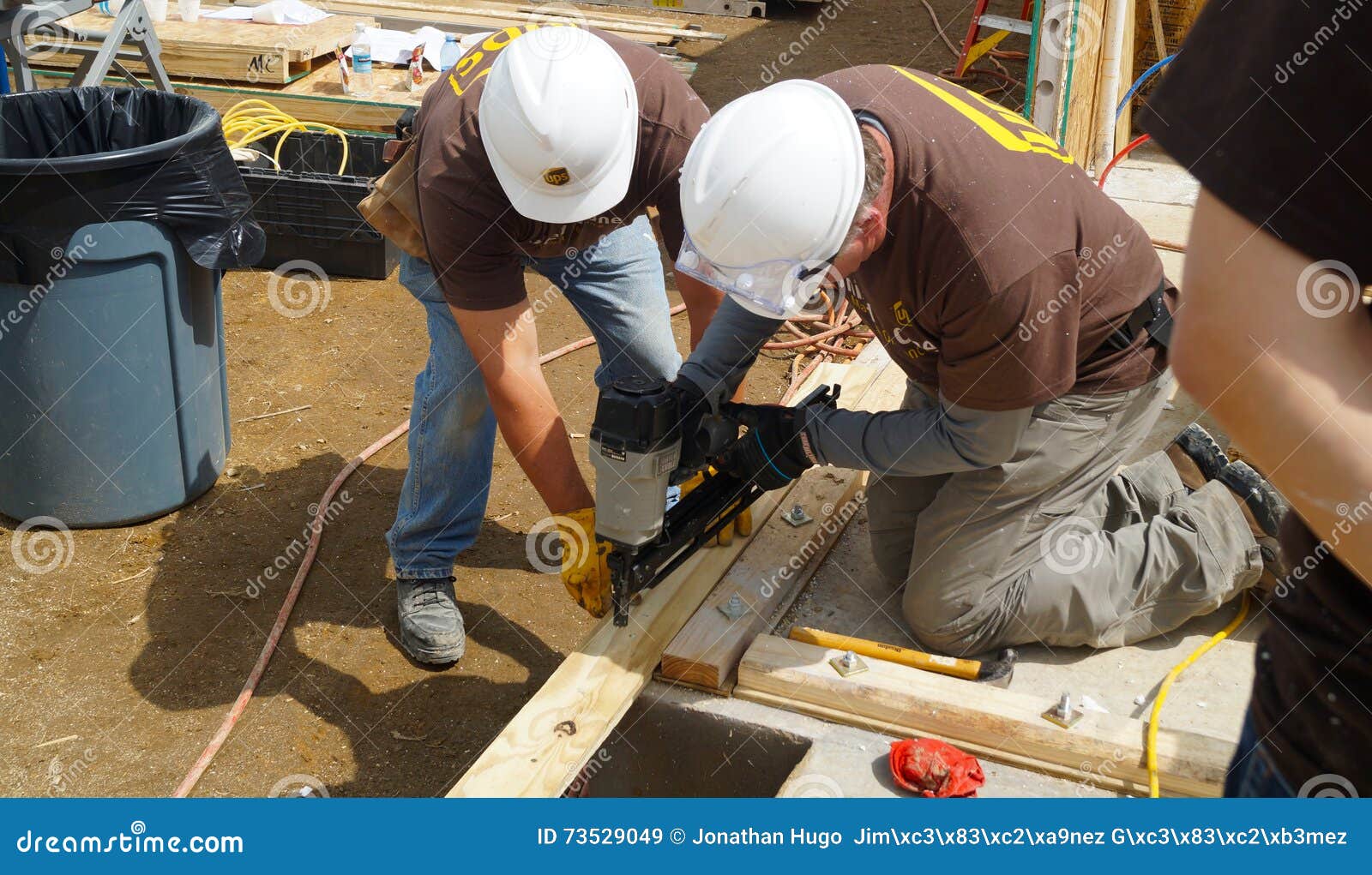 Two Men Nailing Wood Strips Editorial Stock Image - Image of join ...