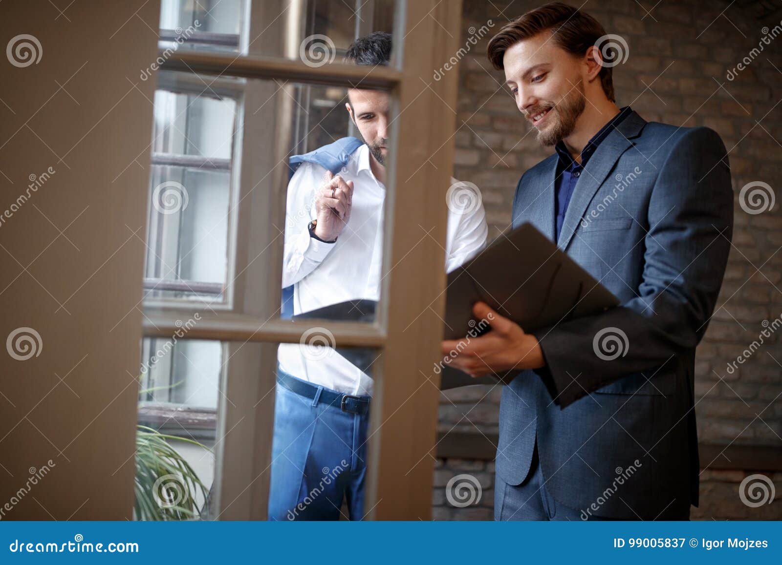 Two Men in Office Talking about Work Stock Image - Image of firm ...