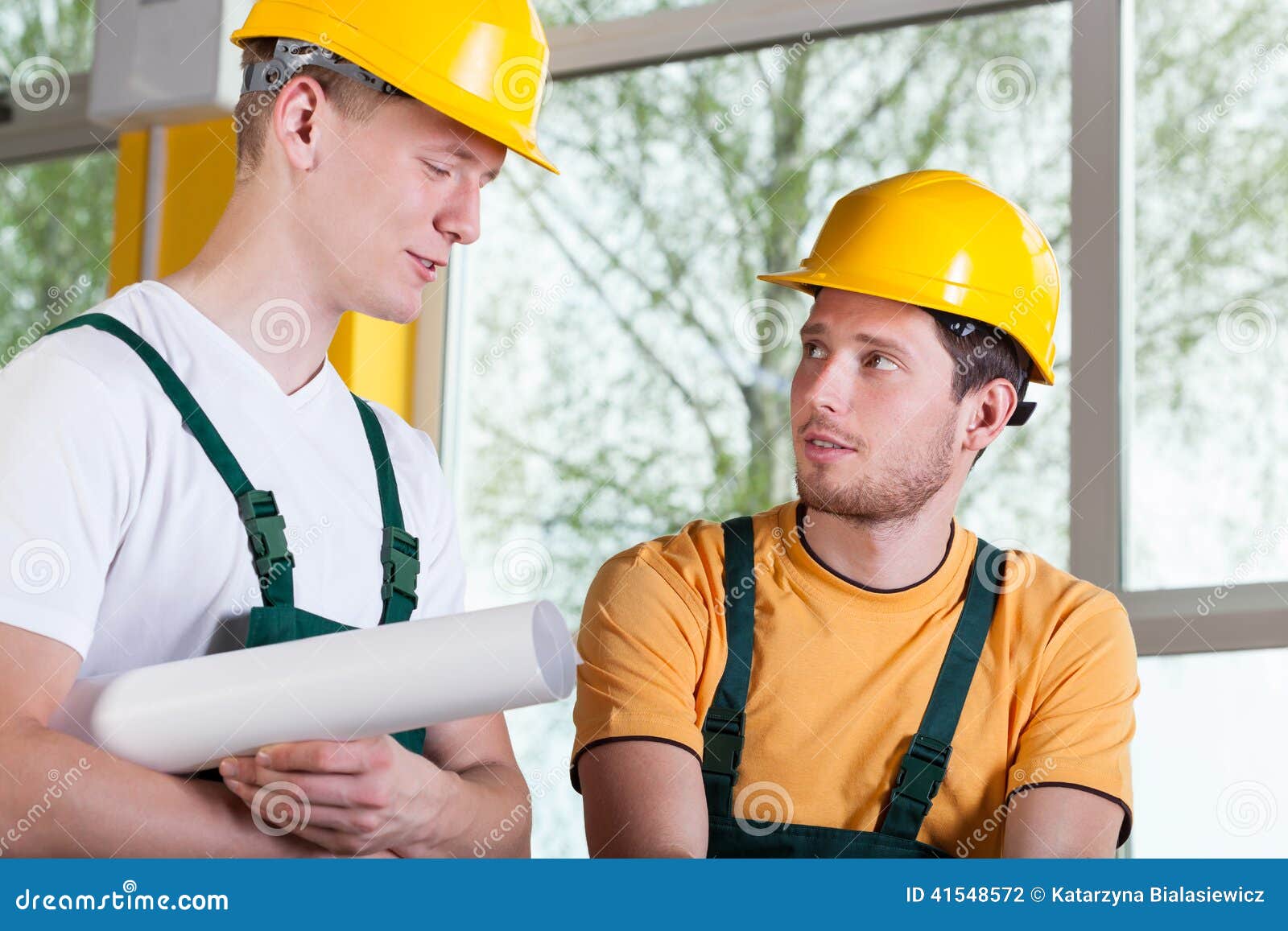 Two Men in Overalls and Hardhat during Work Stock Photo - Image of ...