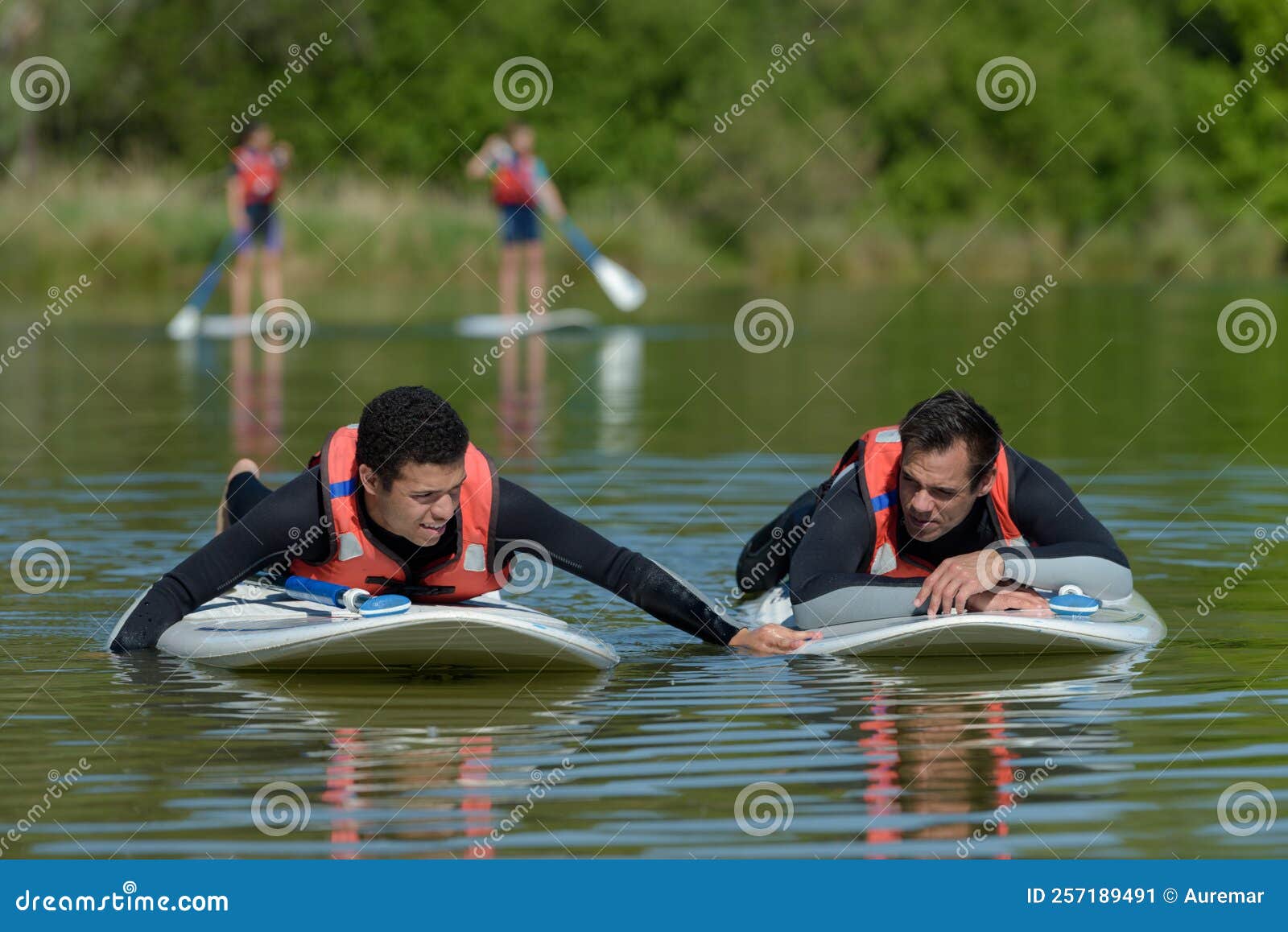 Two Men and Paddle Surfboards Stock Image - Image of person, canal ...