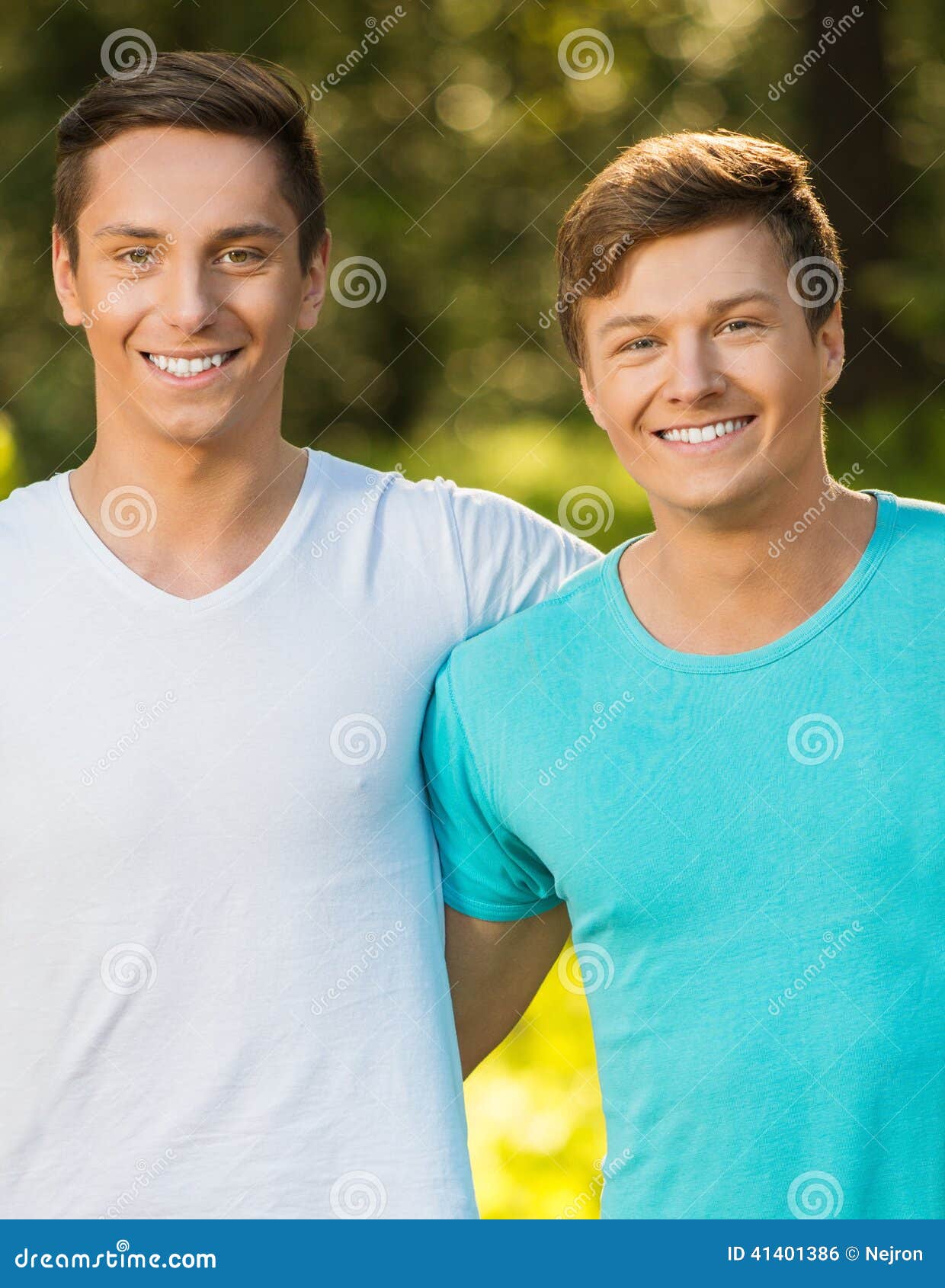 Two men in a park stock photo. Image of friend, lifestyle - 41401386