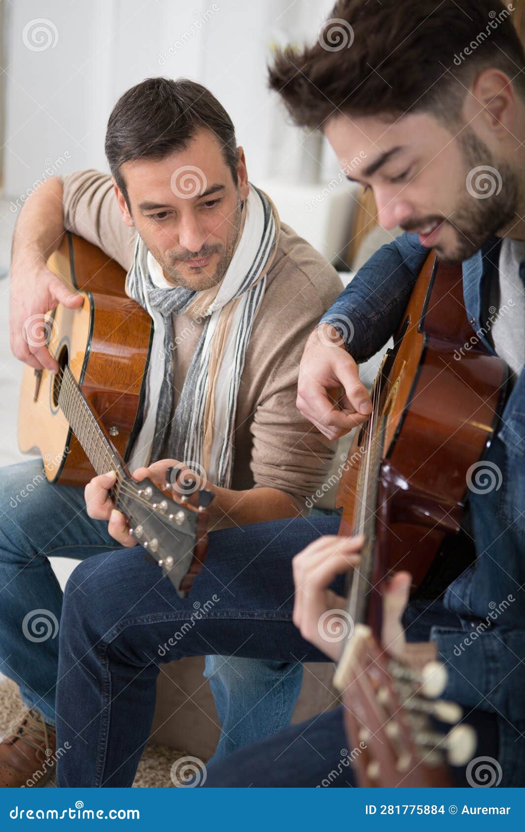 Two men playing guitar stock photo. Image of talent - 281775884