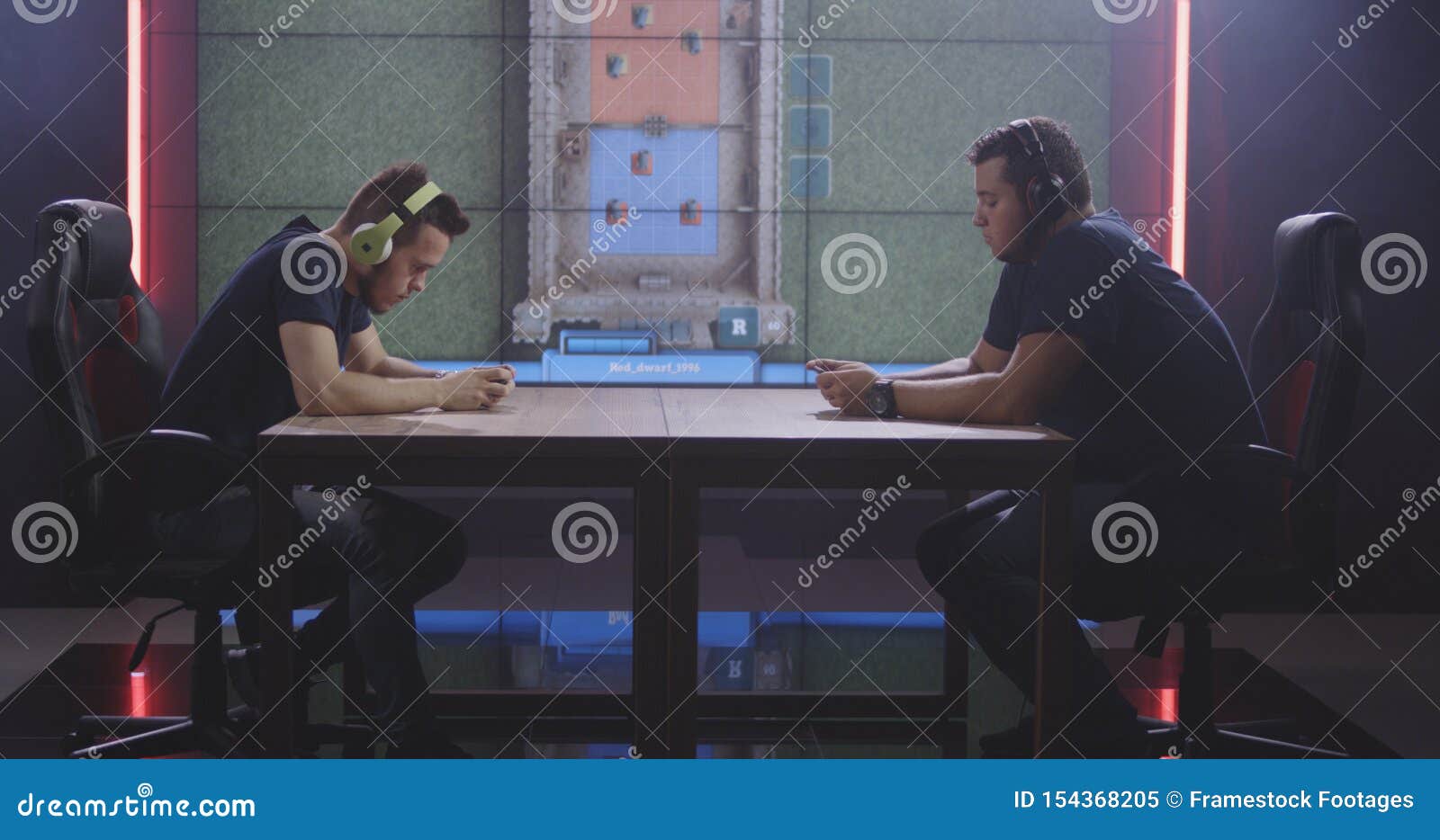 Two Men Playing Mobile Game at a Tournament Stock Image - Image of ...
