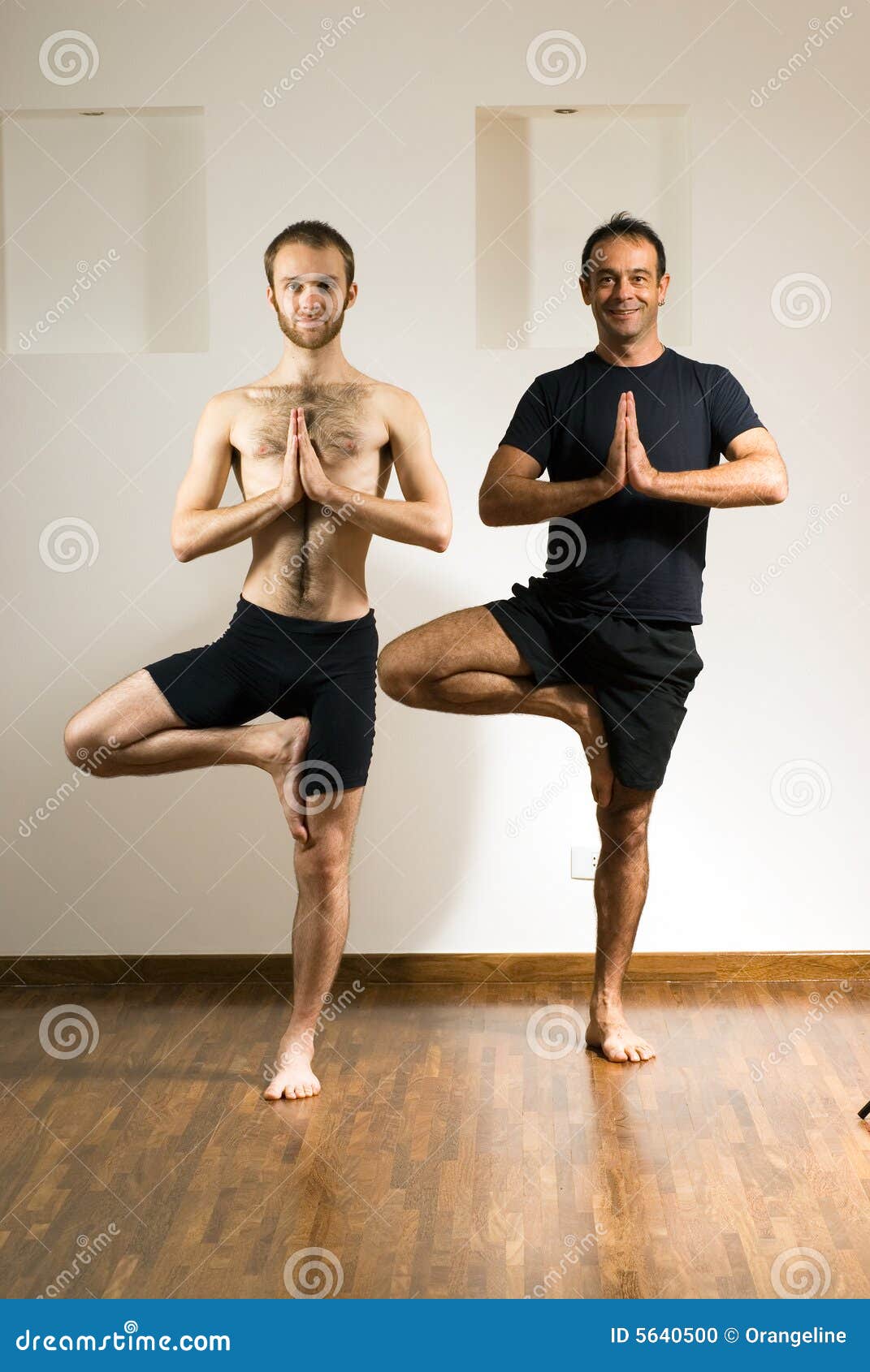 Two Men Practicing Yoga - Vertical Stock Photo - Image of adult ...