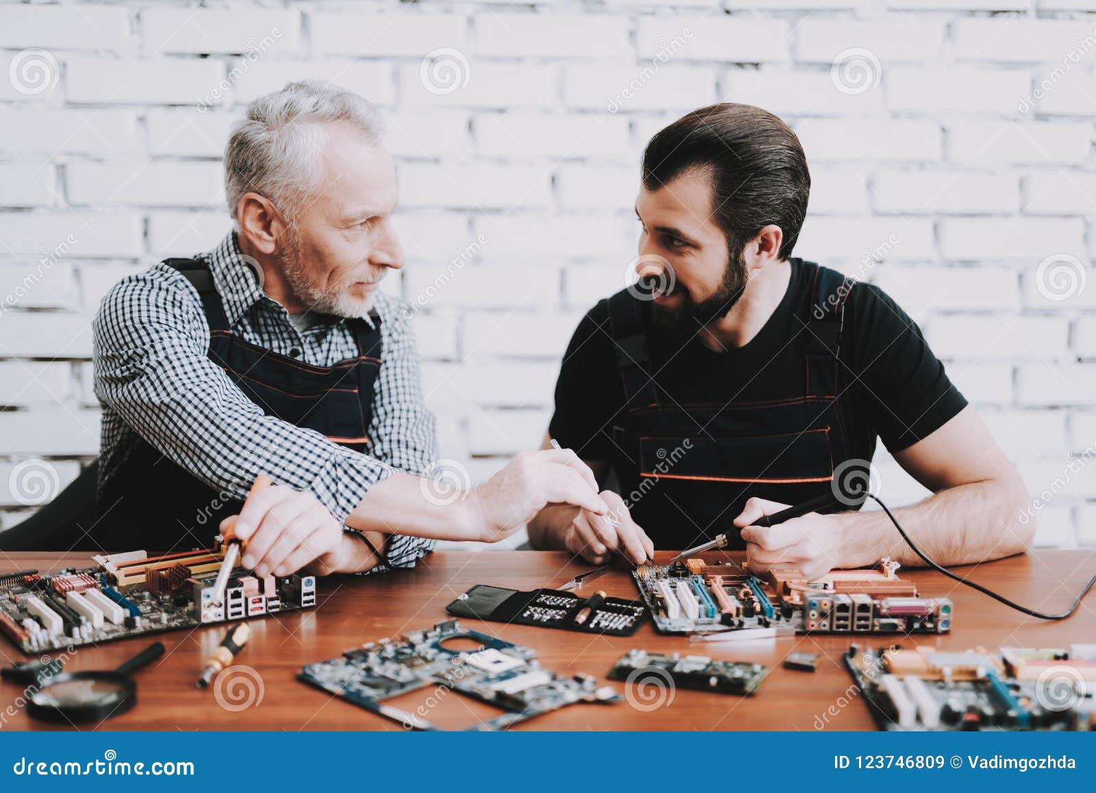 Two Men Repairing Hardware Equipment from PC. Stock Image - Image of ...