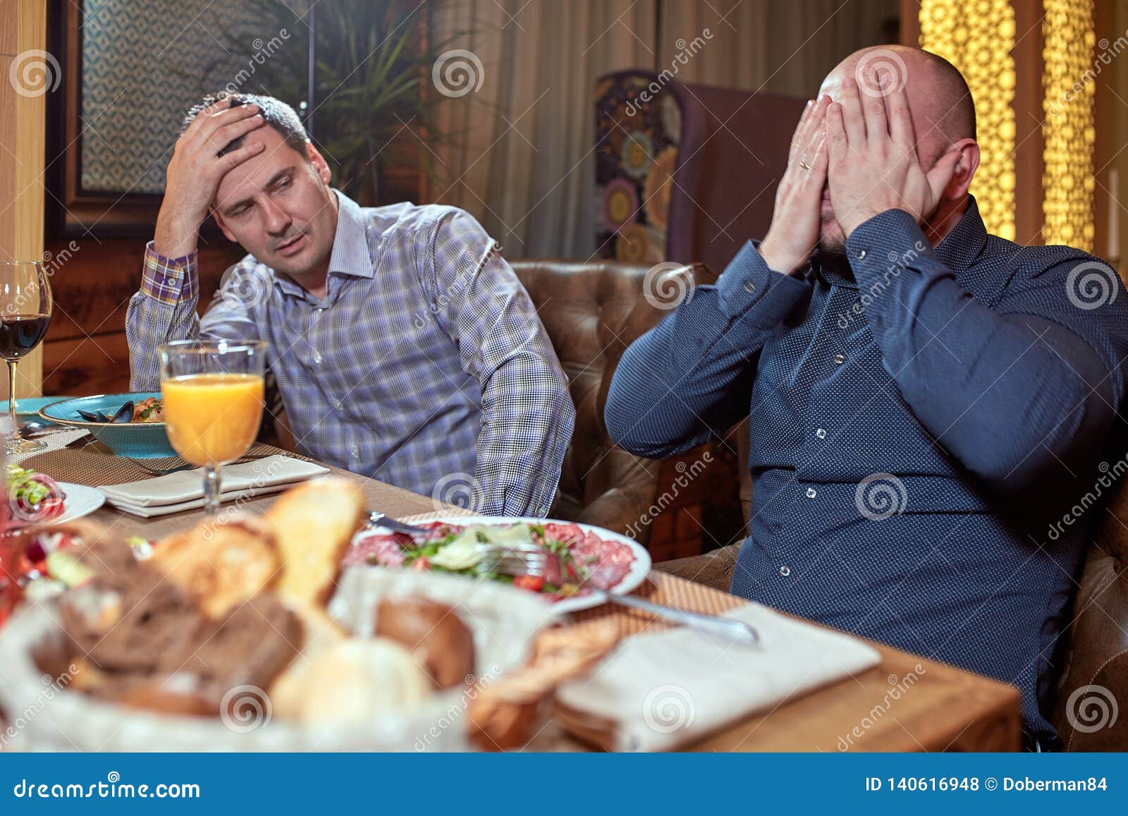Two Men in a Restaurant Arguing during Lunch Stock Photo - Image of ...