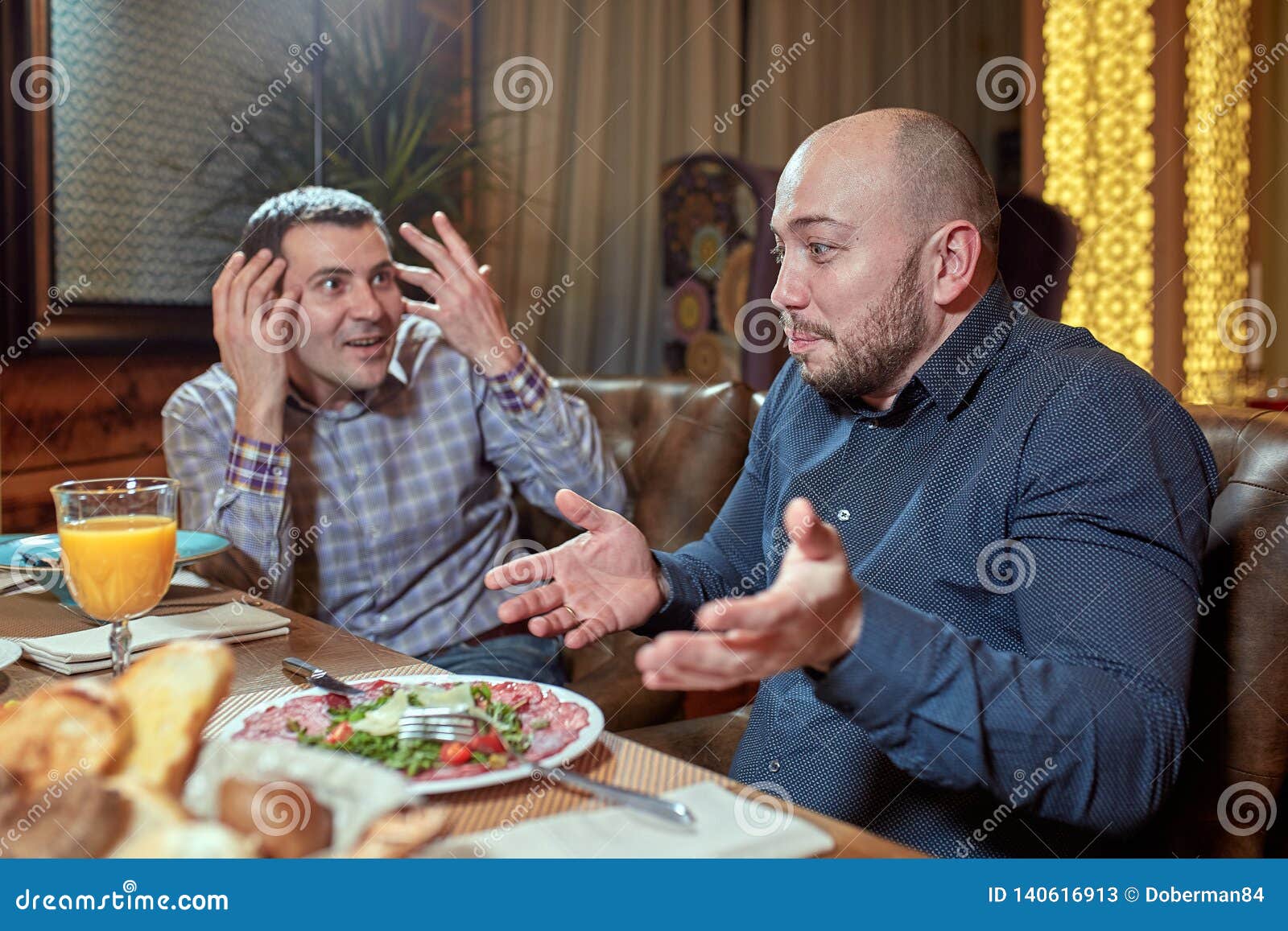 Two Men in a Restaurant Arguing during Lunch Stock Image - Image of ...