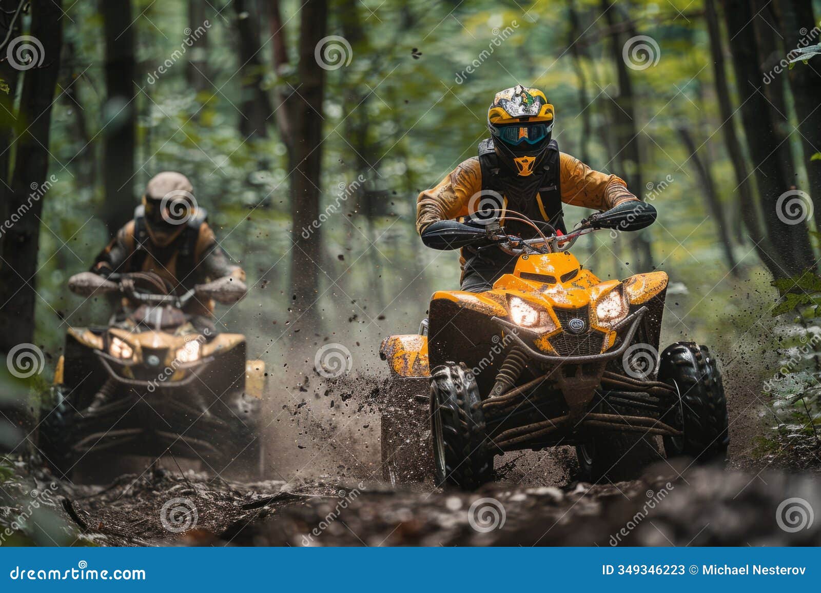 Two Men Riding Atv Quads in the Forest on Muddy Road during a ...