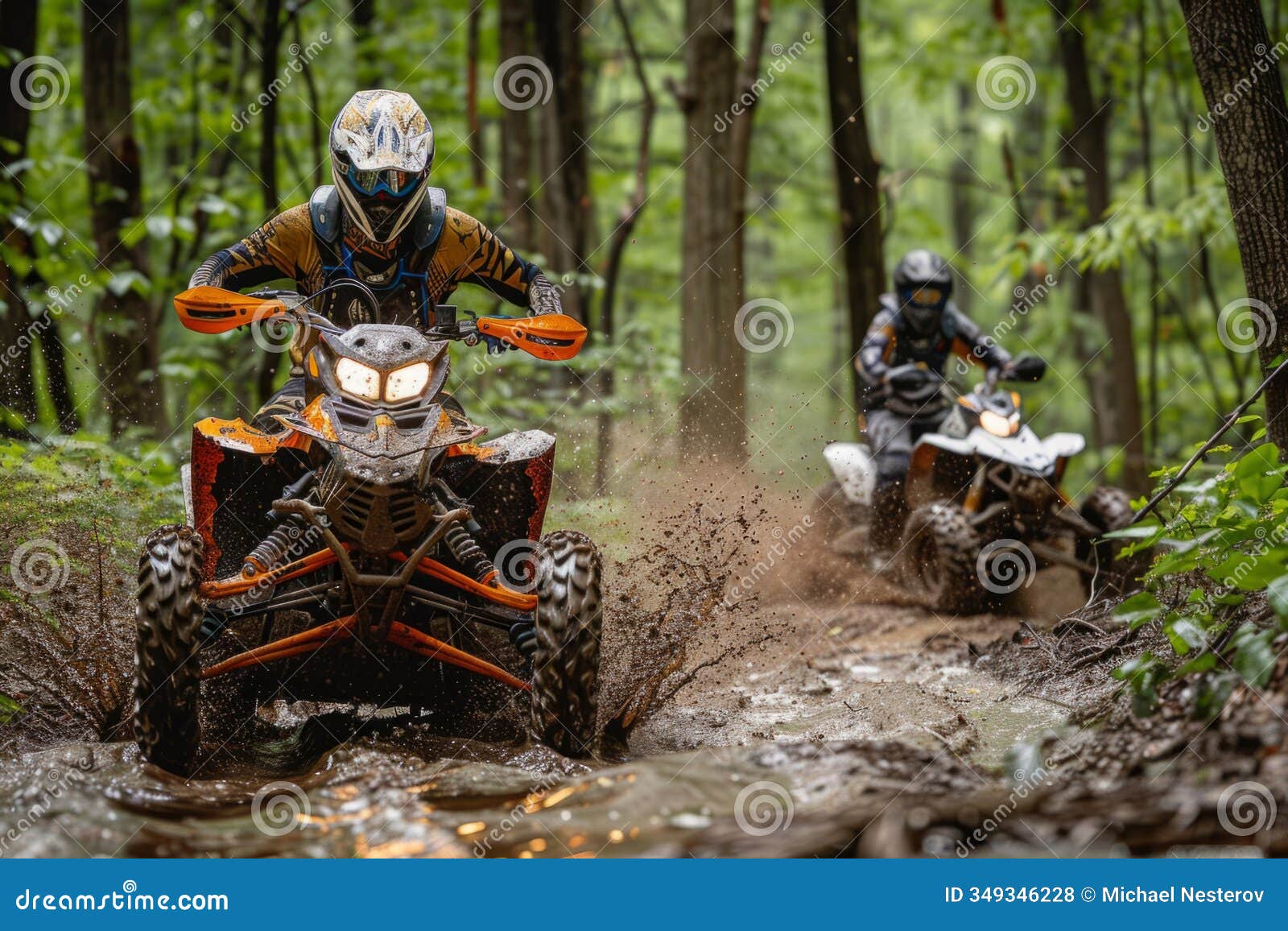 Two Men Riding Atv Quads in Muddy Forest at Sunset Stock Photo - Image ...
