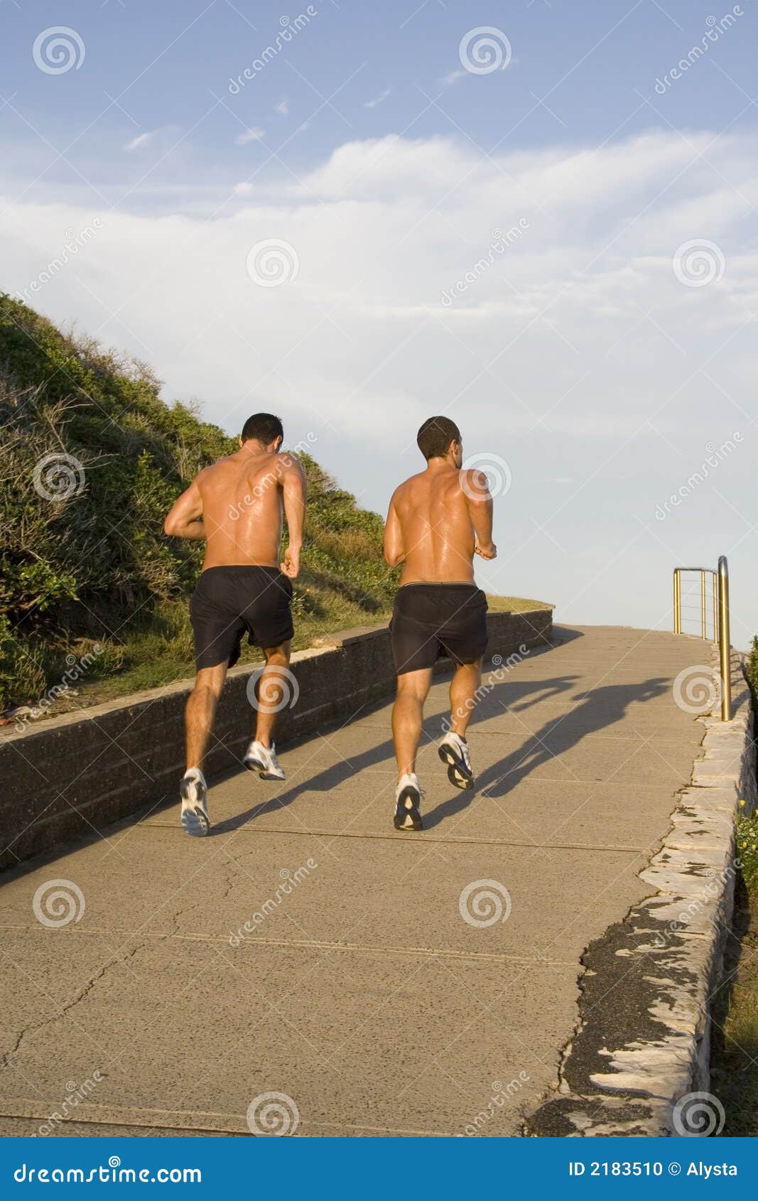 Two Men Running in Summer stock photo. Image of jogging - 2183510