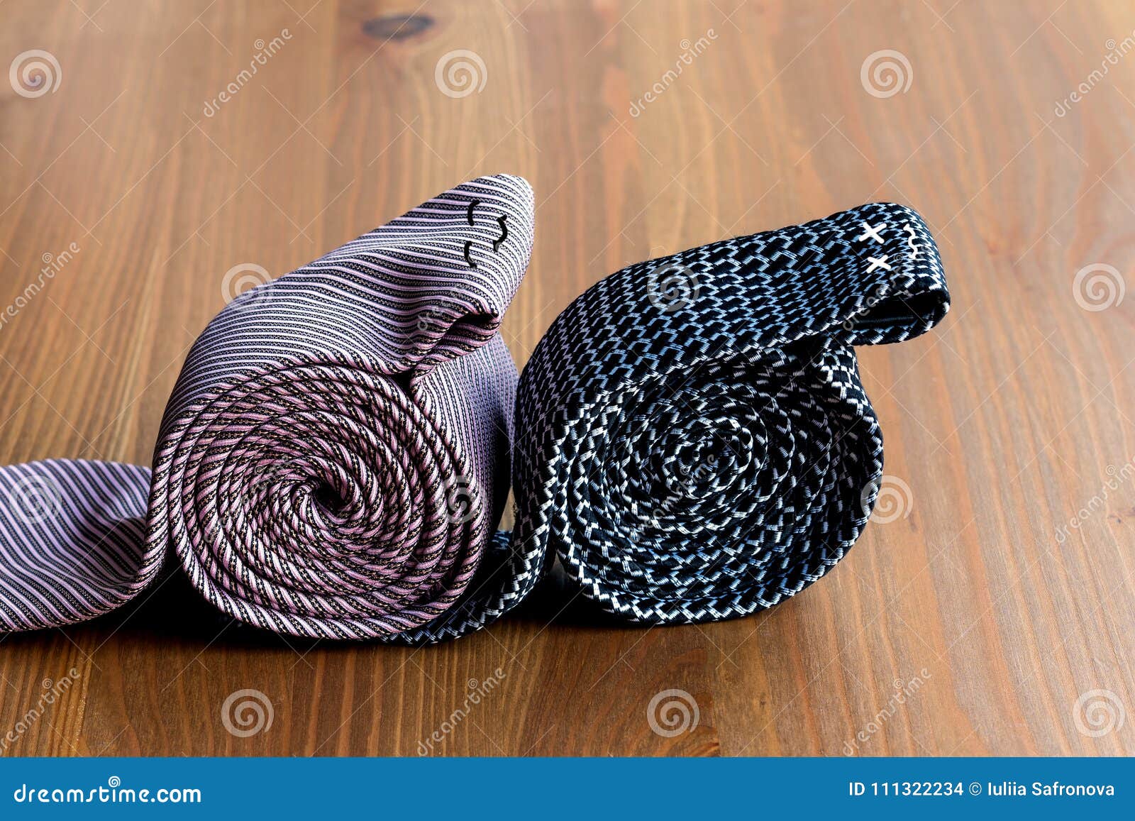 Two Men`s Ties, Rolled Up on a Wooden Background Stock Photo - Image of ...