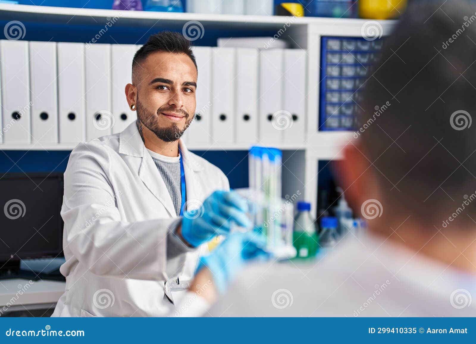 Two Men Scientists Holding Test Tubes at Laboratory Stock Image - Image ...