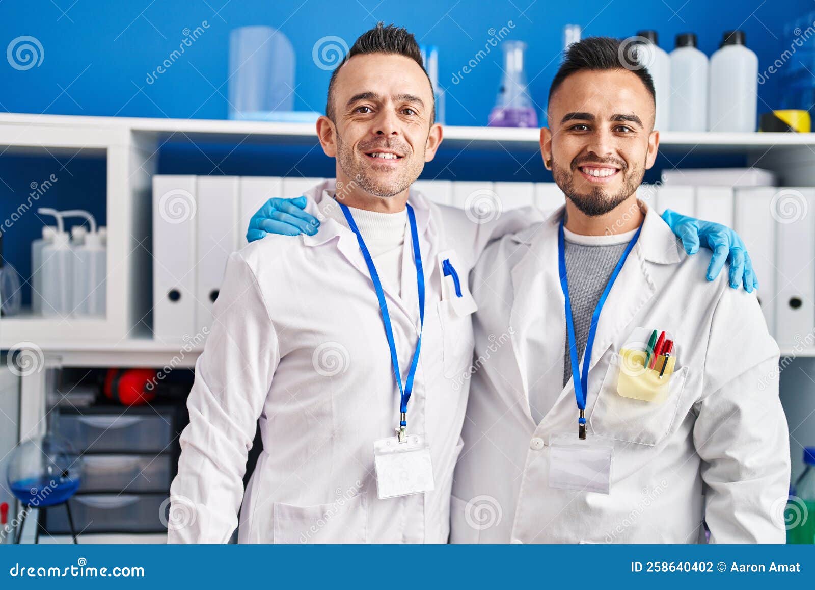 Two Men Scientists Smiling Confident Hugging Each Other at Laboratory ...