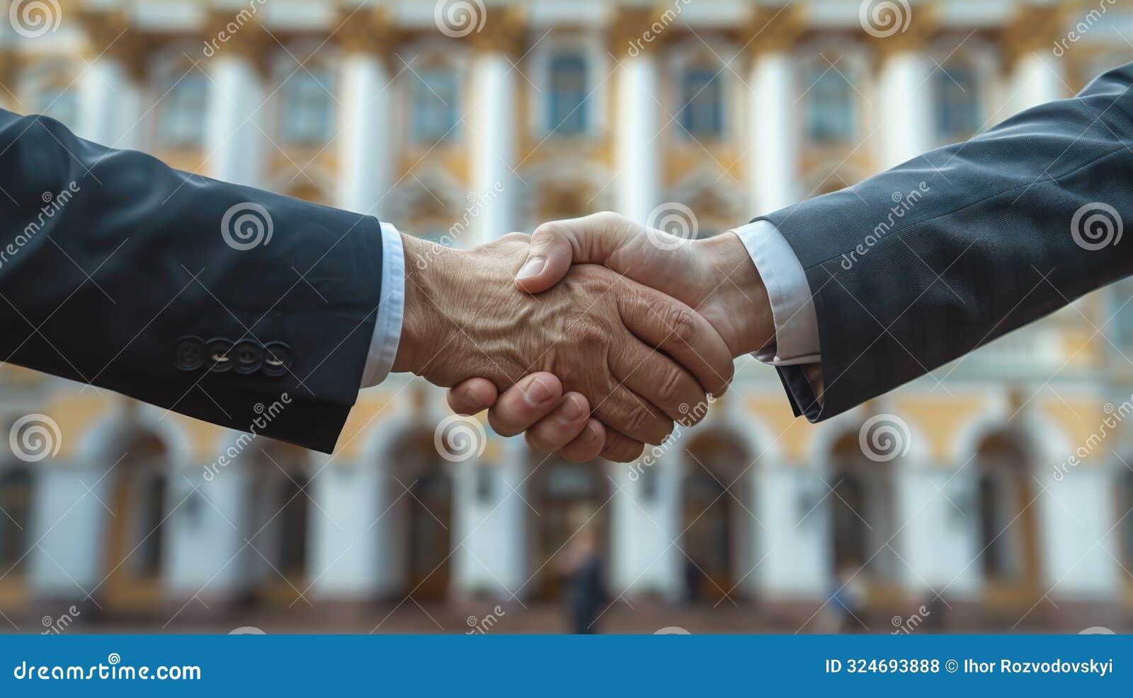 Two Men Shaking Hands. Signing an Important Agreement. Stock ...